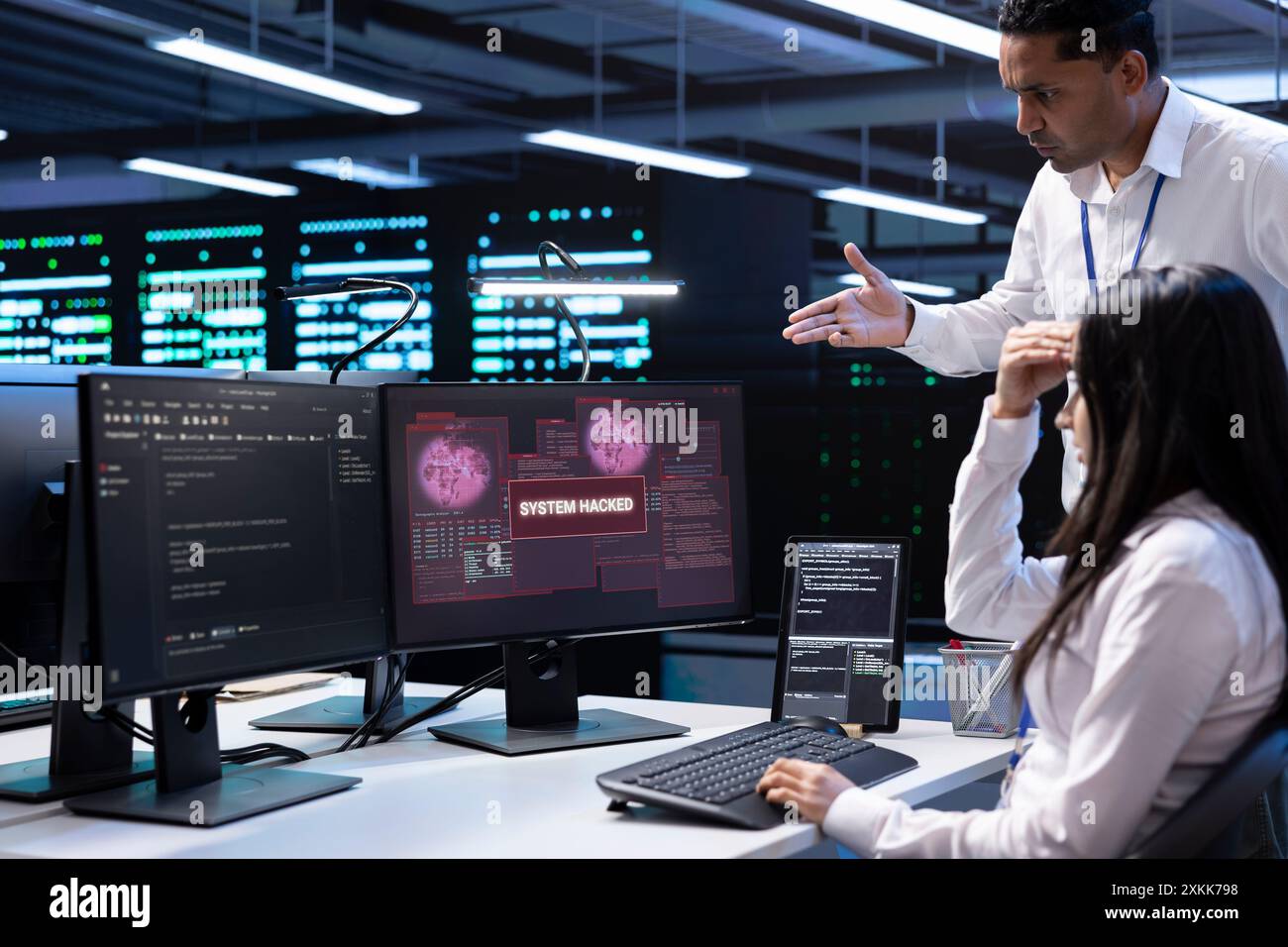 Hacker man trying breach security hi-res stock photography and images ...