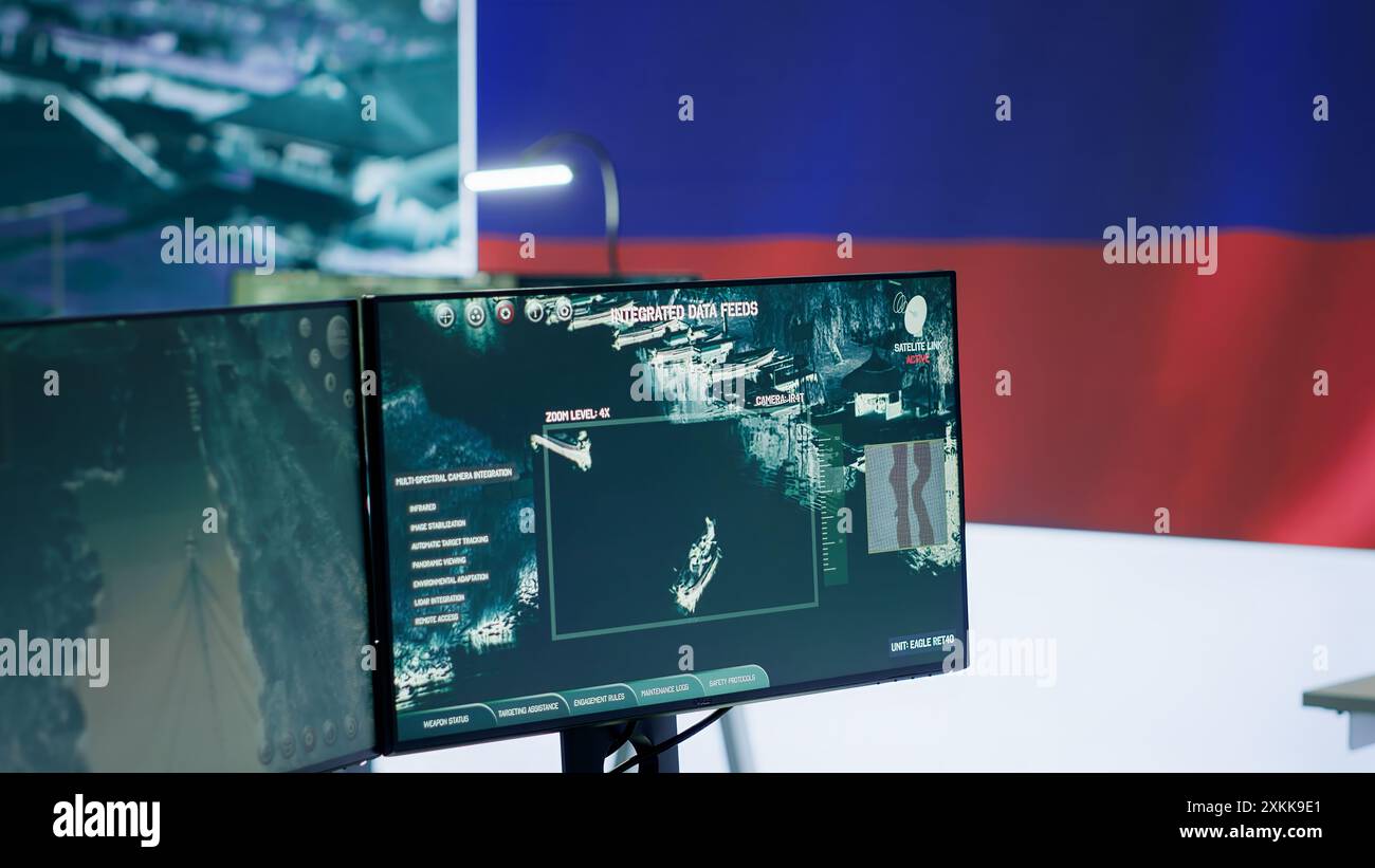 Modern army control center monitoring activity on surveillance systems ...