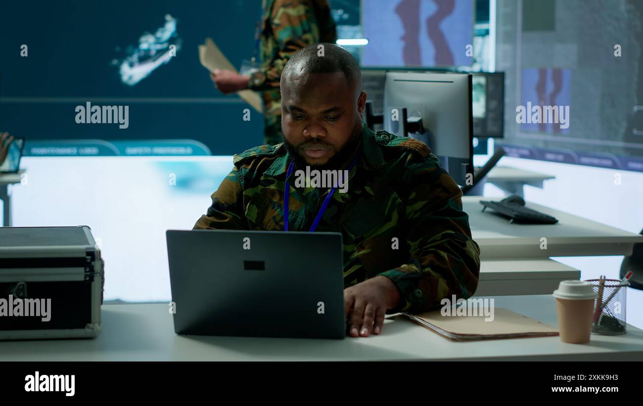 Army intelligence expert utilizes modern computer systems and satellite ...