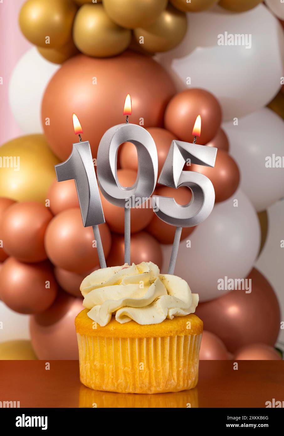 Cupcake with birthday candle on balloons background - Number 105 Stock ...