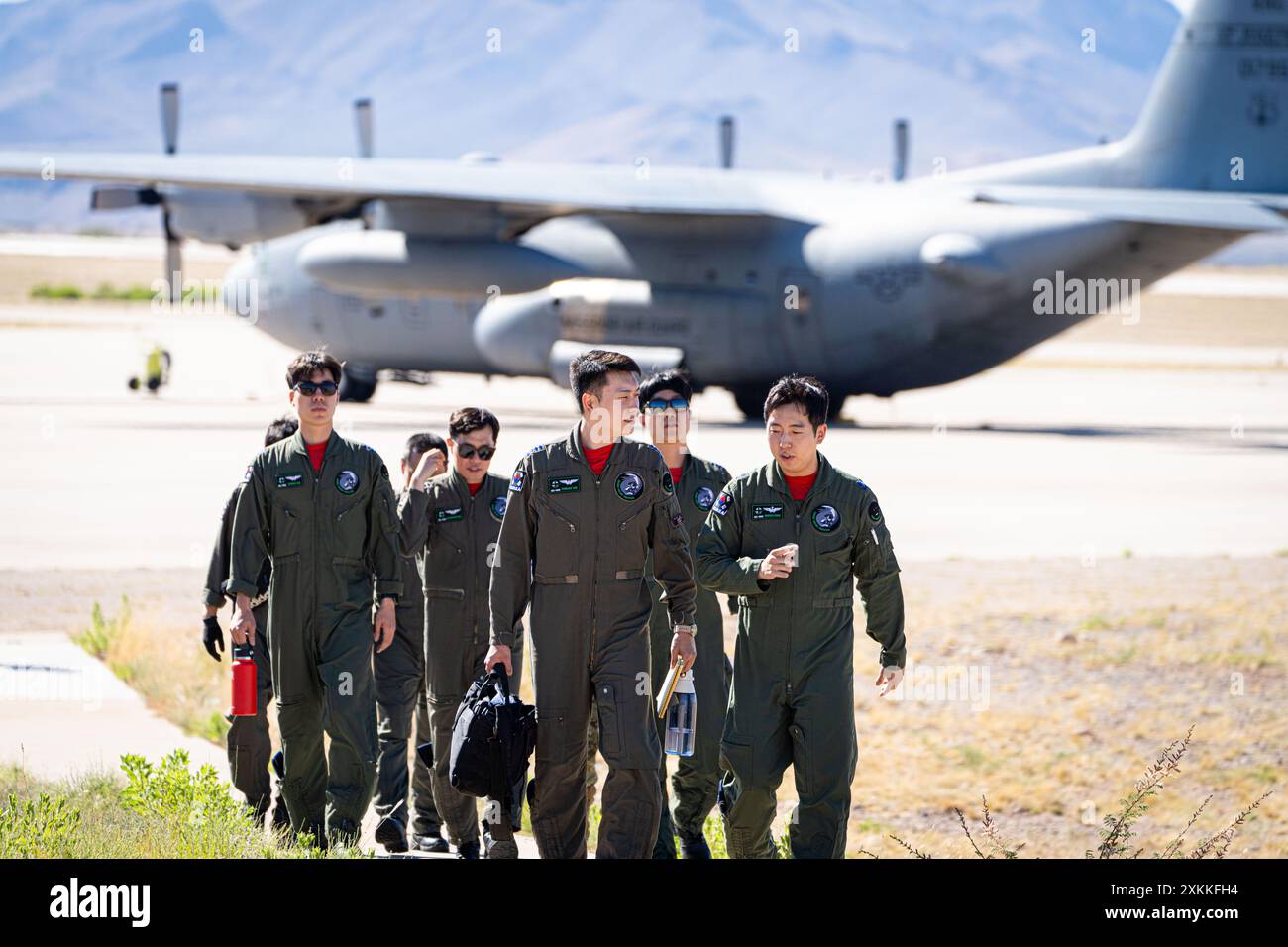 Aircrew members with the Republic of Korea, walk from the flight line ...