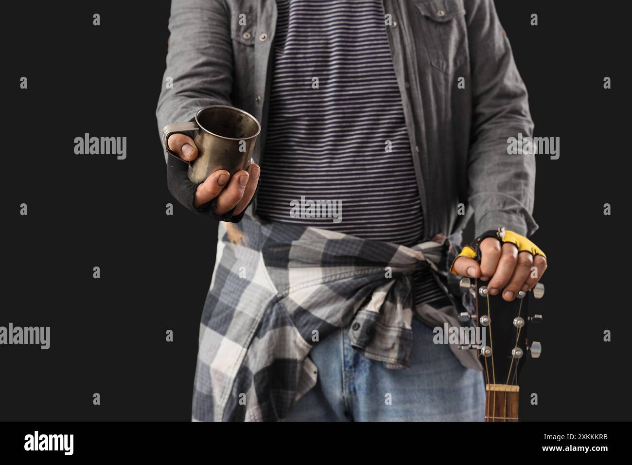 Homeless man cup guitar hi-res stock photography and images - Alamy