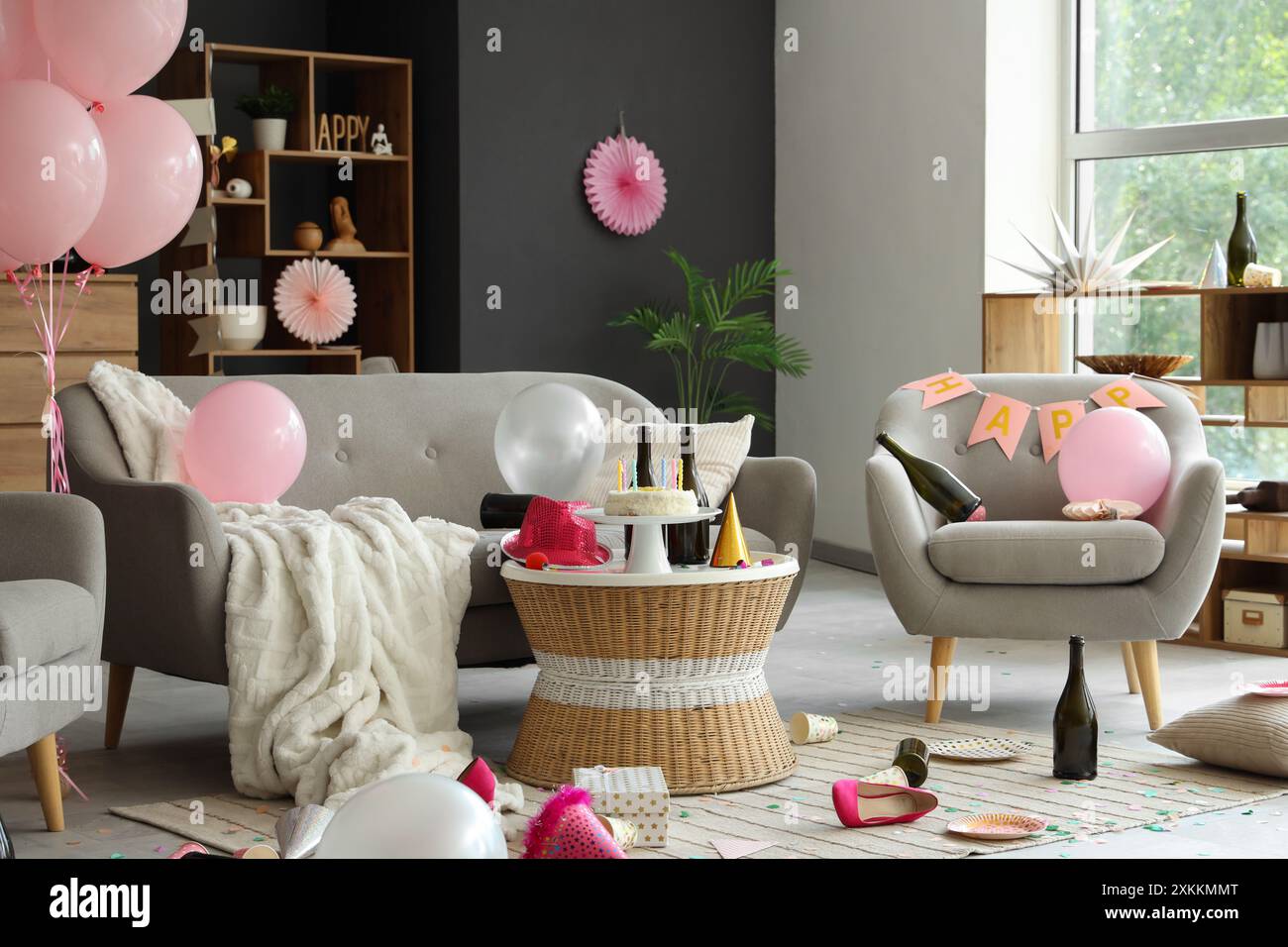 Interior of messy living room after Birthday celebration with sofa ...