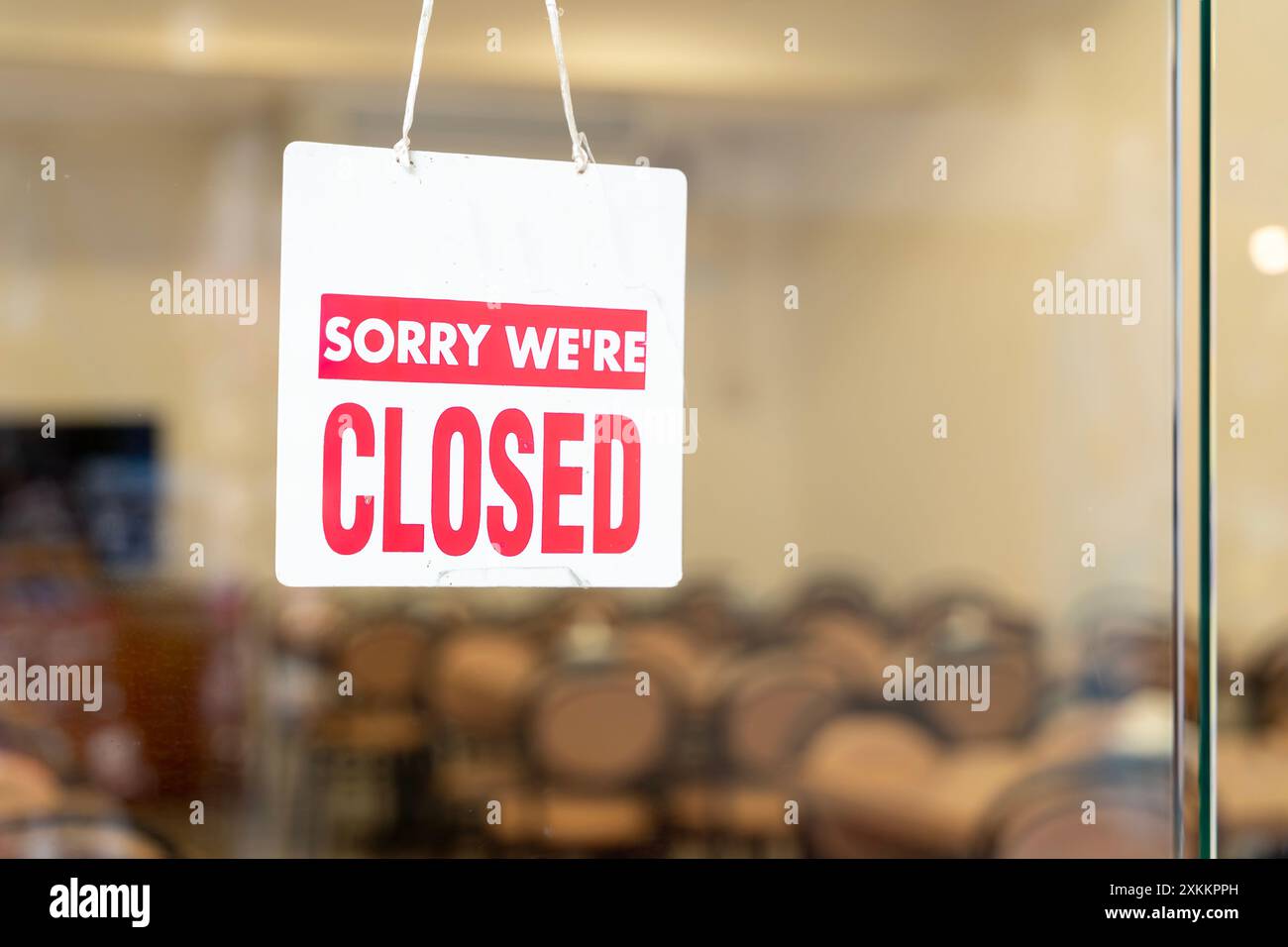 Store closed sign hanging on the window. Closed sign hanging in ...