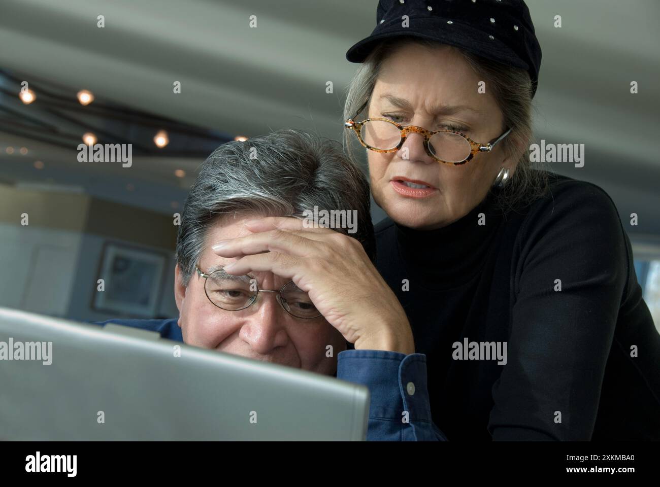 Mature man laptop concern hi-res stock photography and images - Alamy