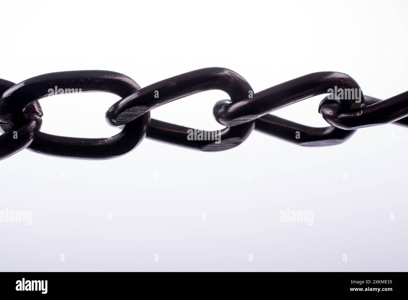 metal chain on white background Stock Photo - Alamy