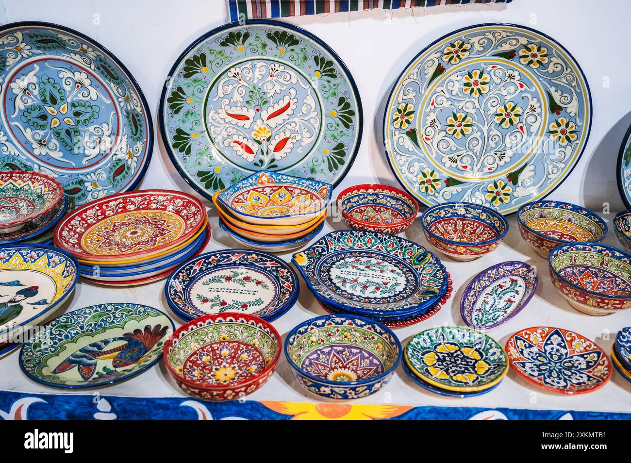 colorful traditional Asian Uzbek ceramic plates hand-painted at the ...