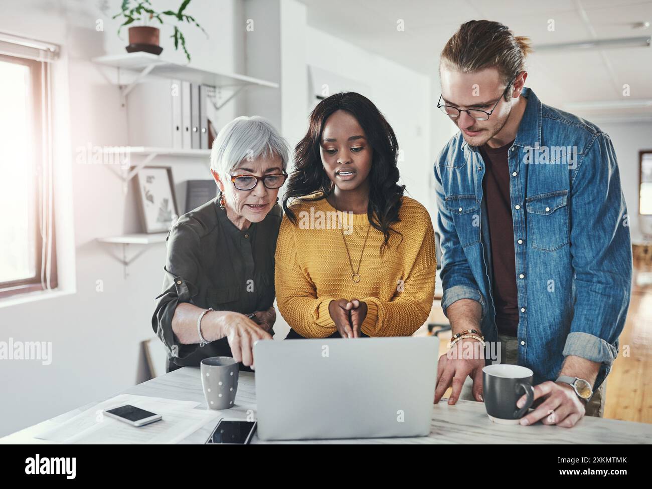 Teamwork, laptop and business people in office with feedback, project ...