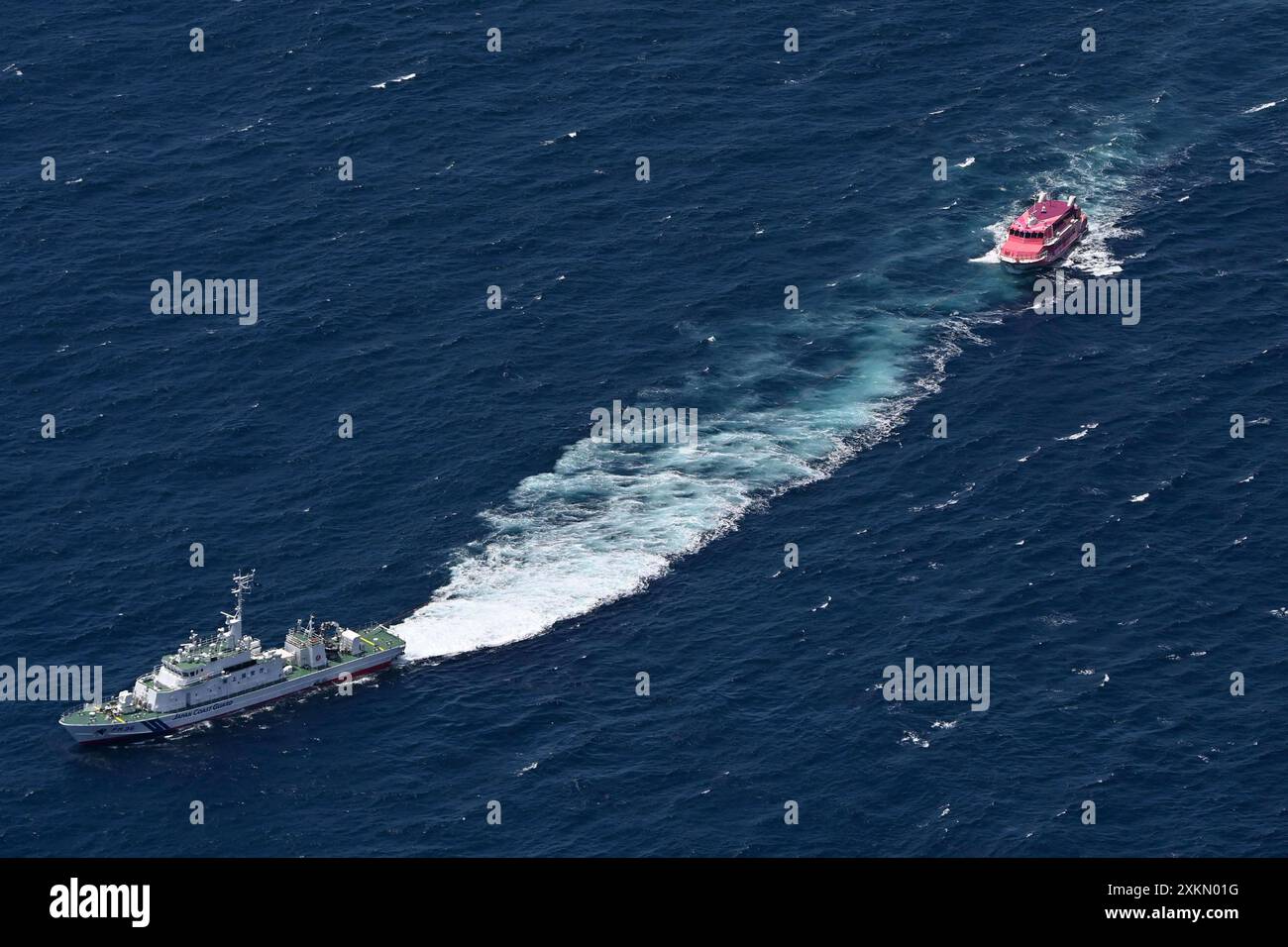 An aerial photo shows Seven Island Ai (top), a hydrofoil ferry being ...