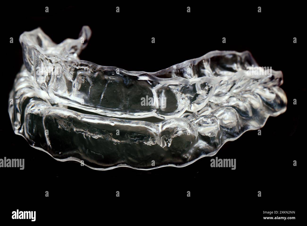 plastic braces isolated on the black background Stock Photo - Alamy