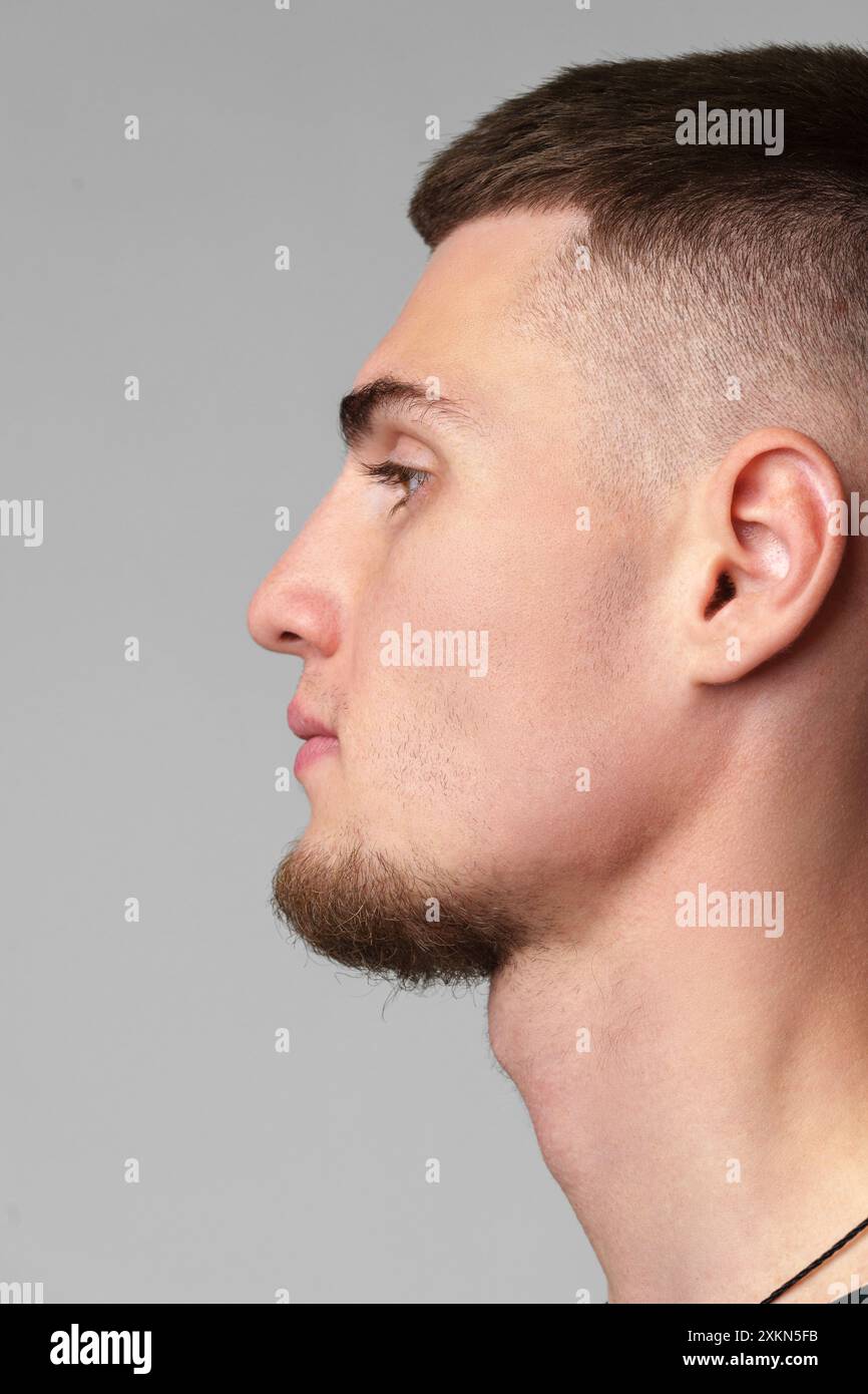 Profile Portrait of Young Man With Short Hair and Goatee Stock Photo ...
