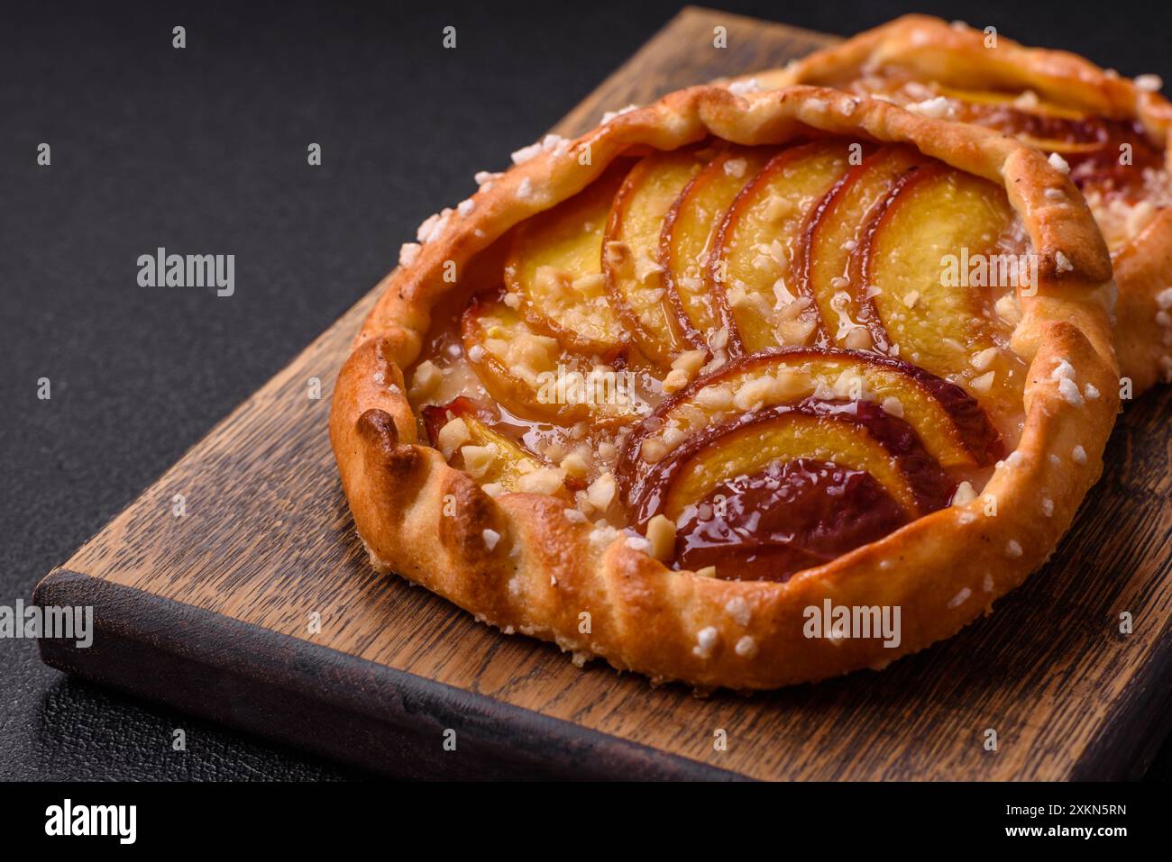 Delicious sweet crispy galettes with fruits and cinnamon baked at home ...