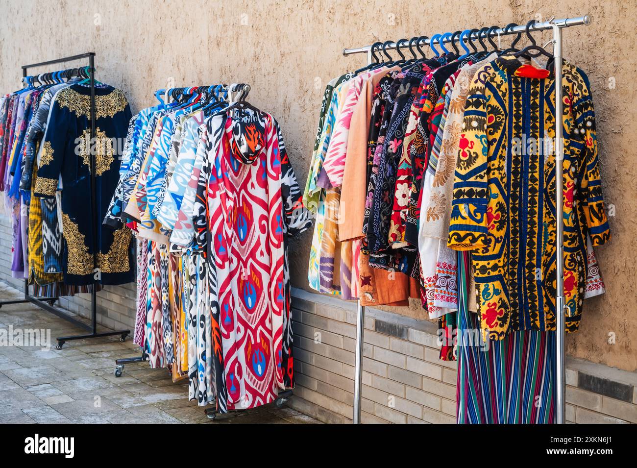 traditional arab silk dresses with a bright colorful pattern in ...