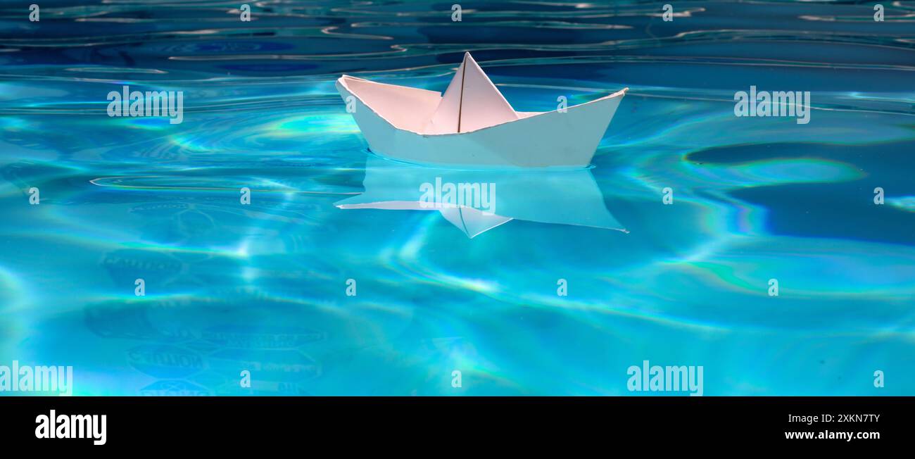 Paper ship sail. Paper boat on the sea water background. Dreaming ...