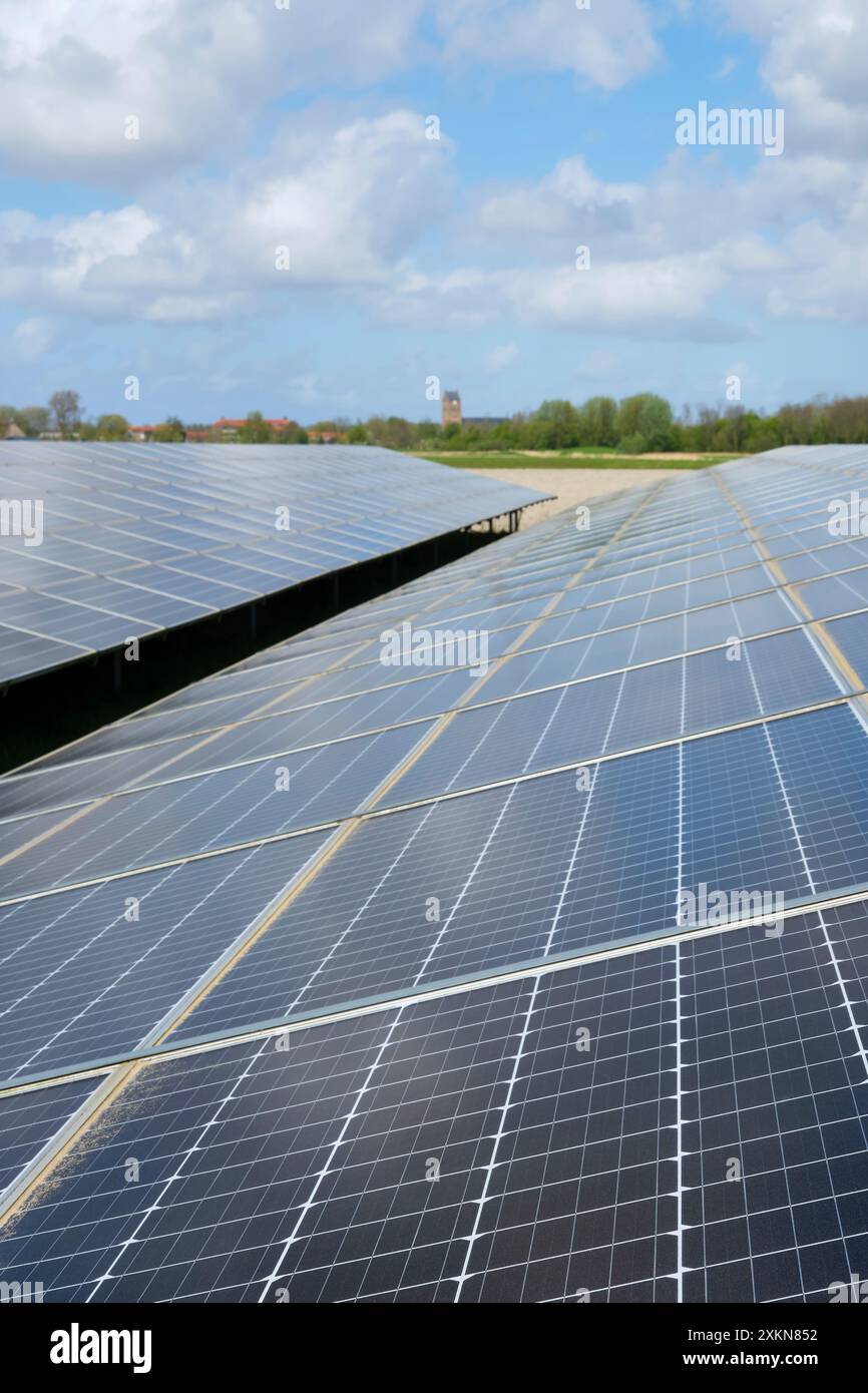 Blue solar cells in a solar panels power farm or photovoltaic cell park ...