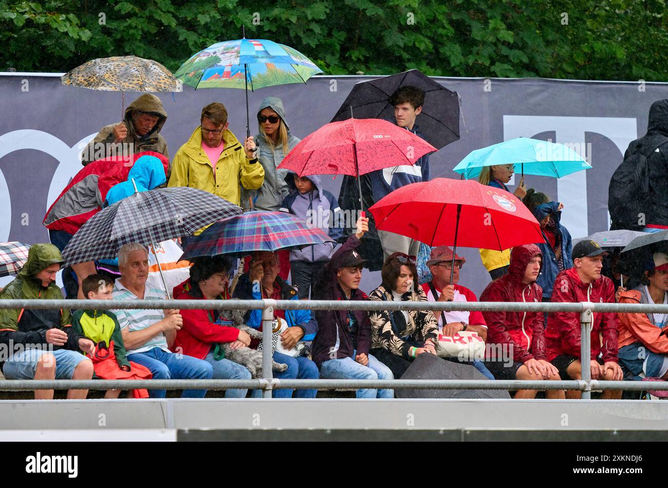 FCB fans in the rain at the FC BAYERN MÜNCHEN Training Camp 1.German ...