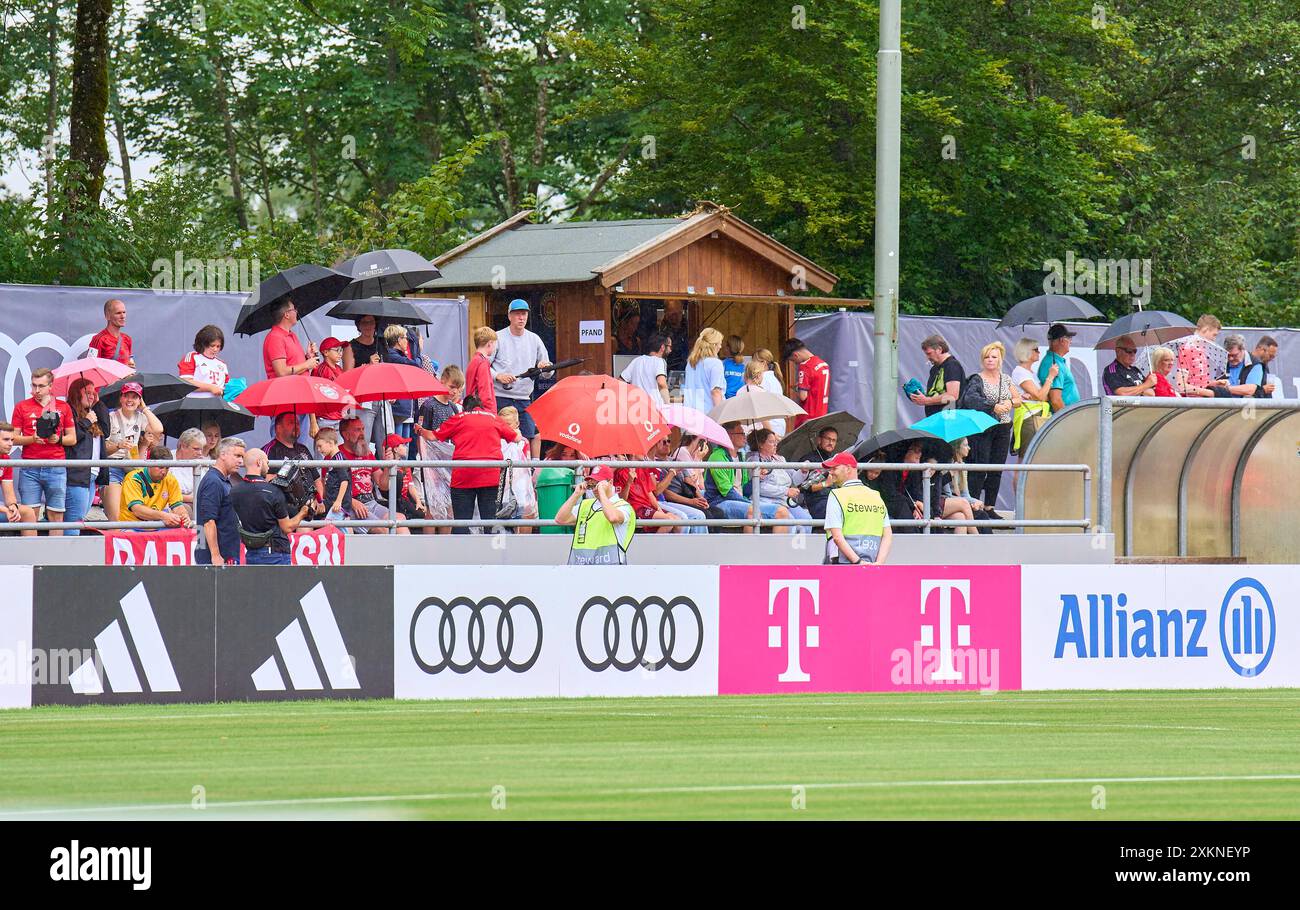 Rottach Egern, Germany. 22nd July, 2024. FCB fans in the rain at the FC ...