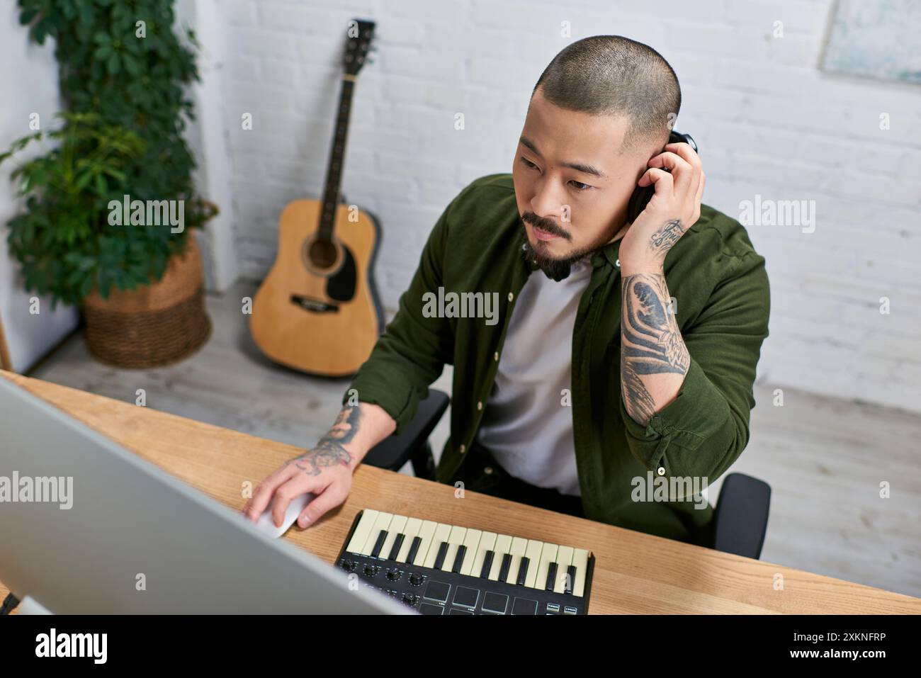 Handsome man plays keyboard hi-res stock photography and images - Alamy