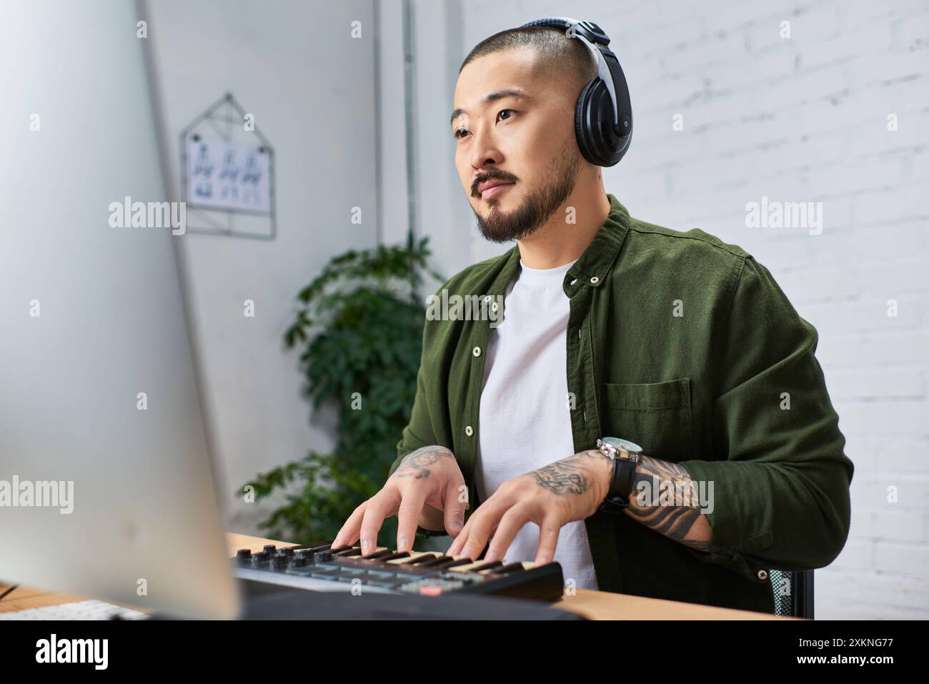 Handsome man plays keyboard hi-res stock photography and images - Alamy