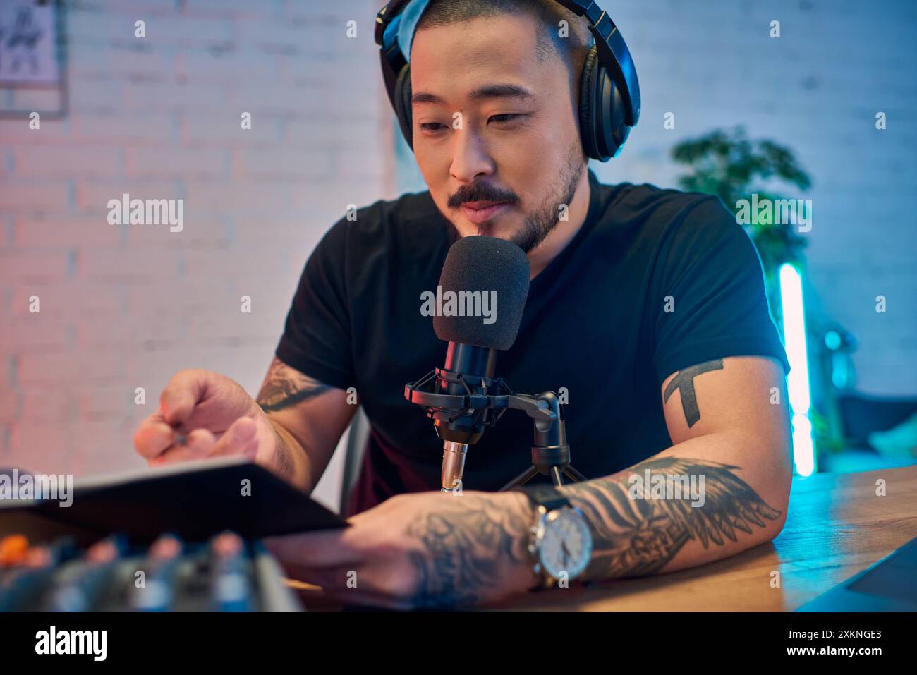 Handsome man interview in studio hi-res stock photography and images ...