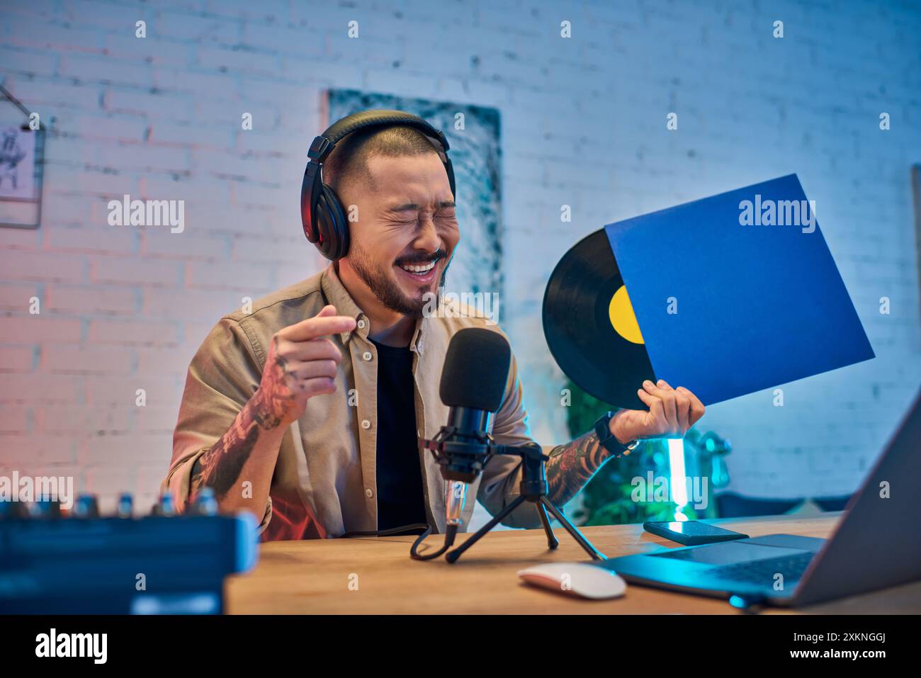 Man wearing headphones recording podcast hi-res stock photography and ...