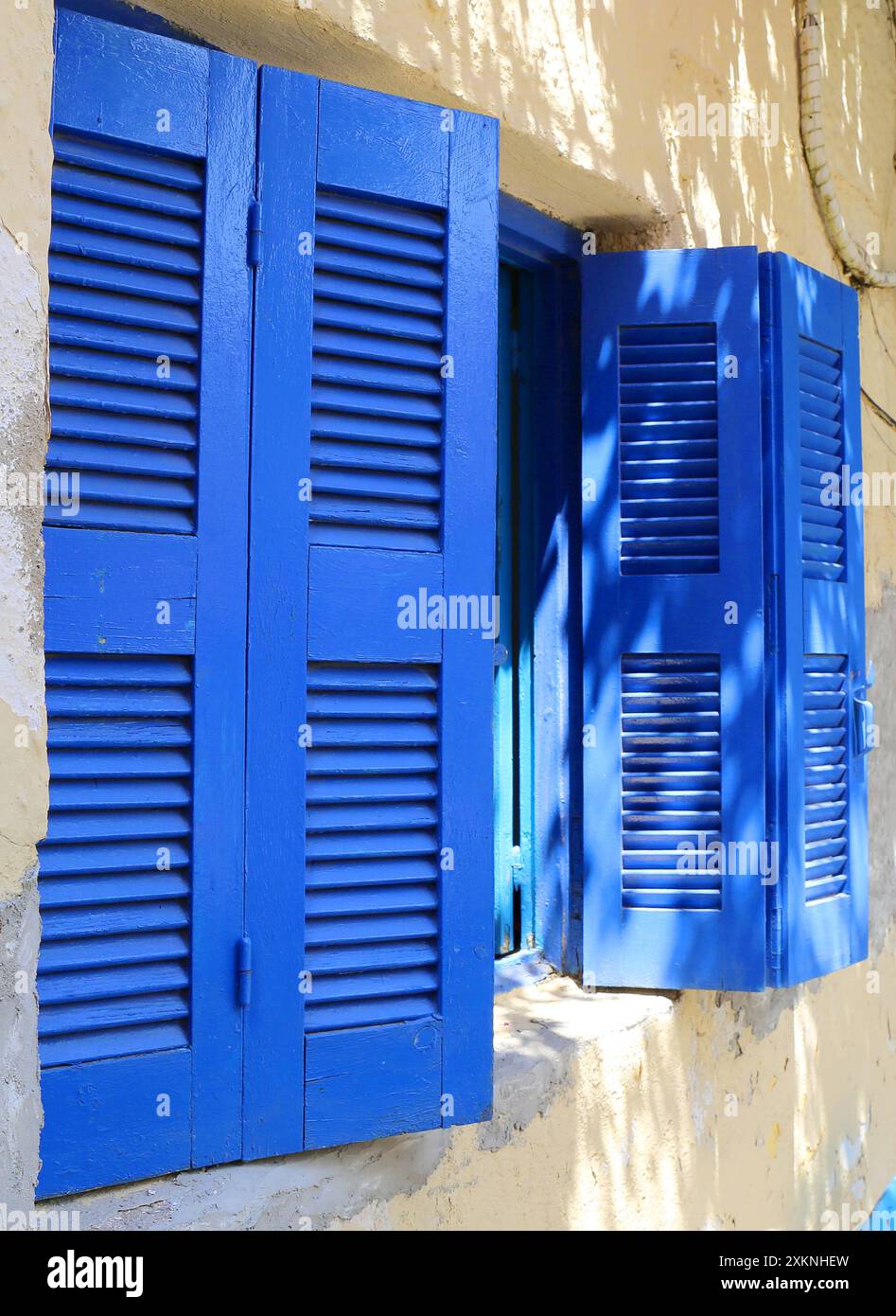 Open traditional greek blue window hi-res stock photography and images ...
