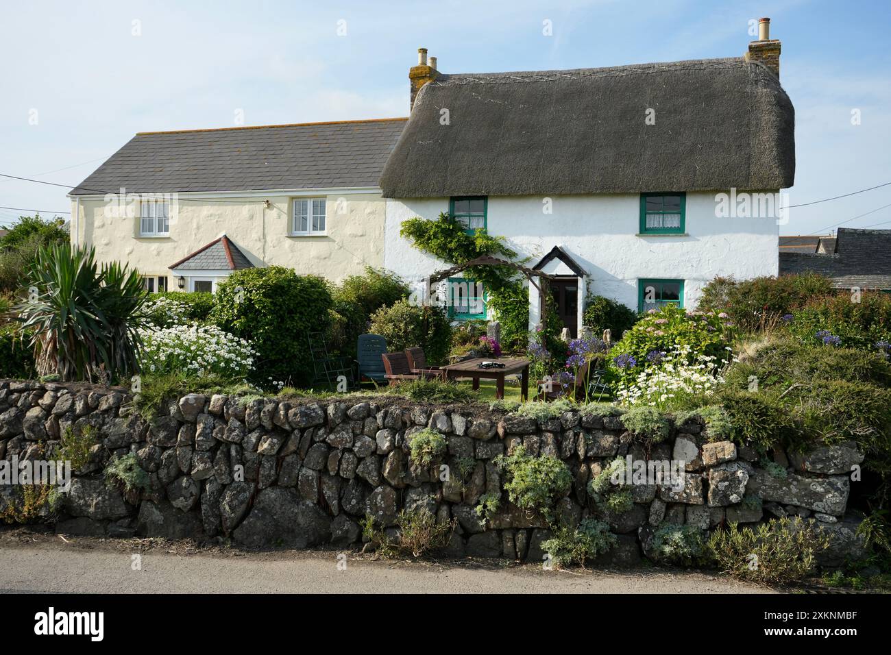 Traditional Cornish cottages, one thatched Stock Photo - Alamy
