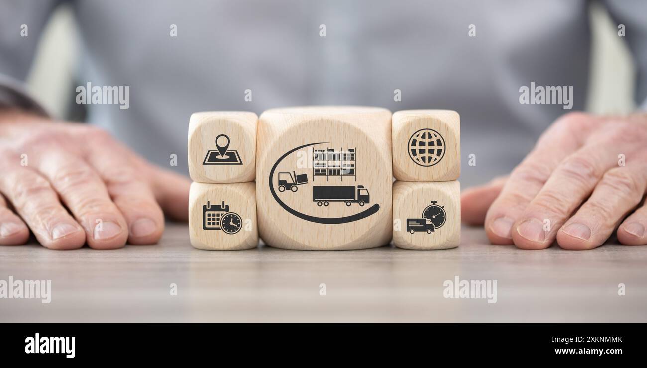 Wooden blocks with symbol of logistics concept Stock Photo - Alamy