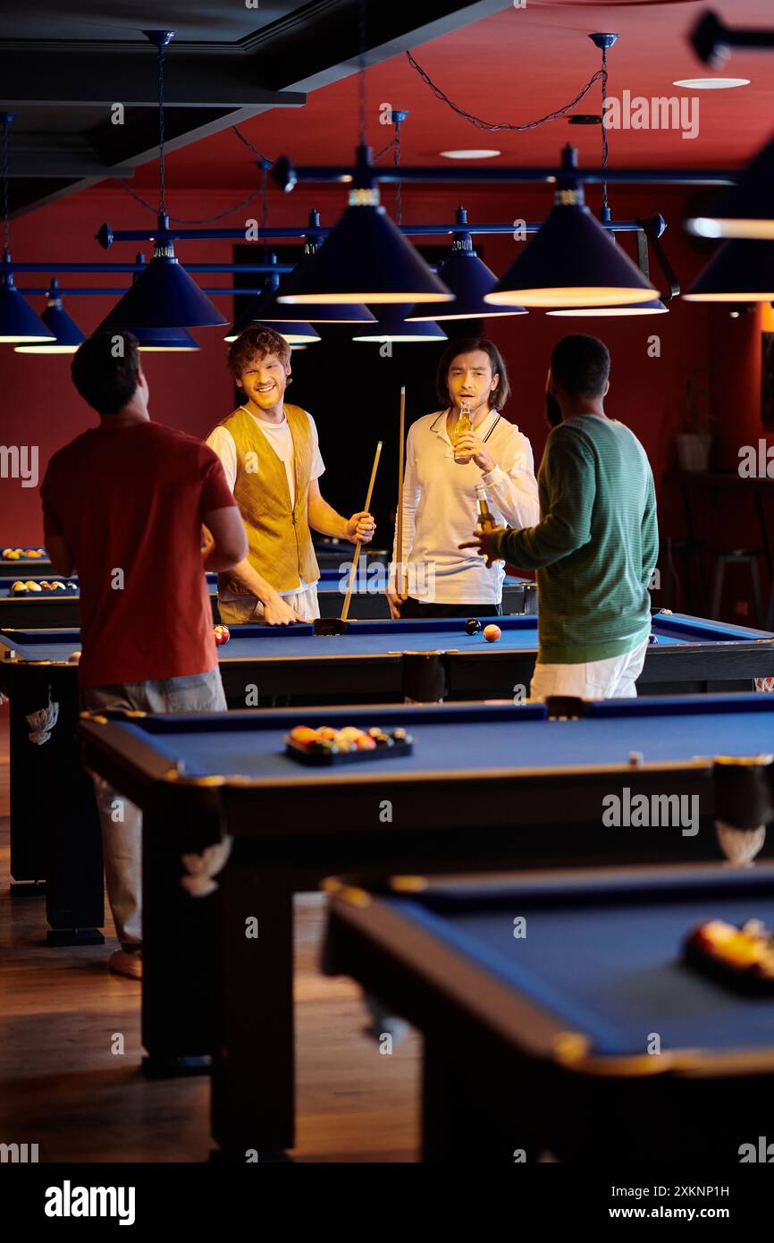 Friends casually dressed play billiards in a dimly lit lounge with blue ...