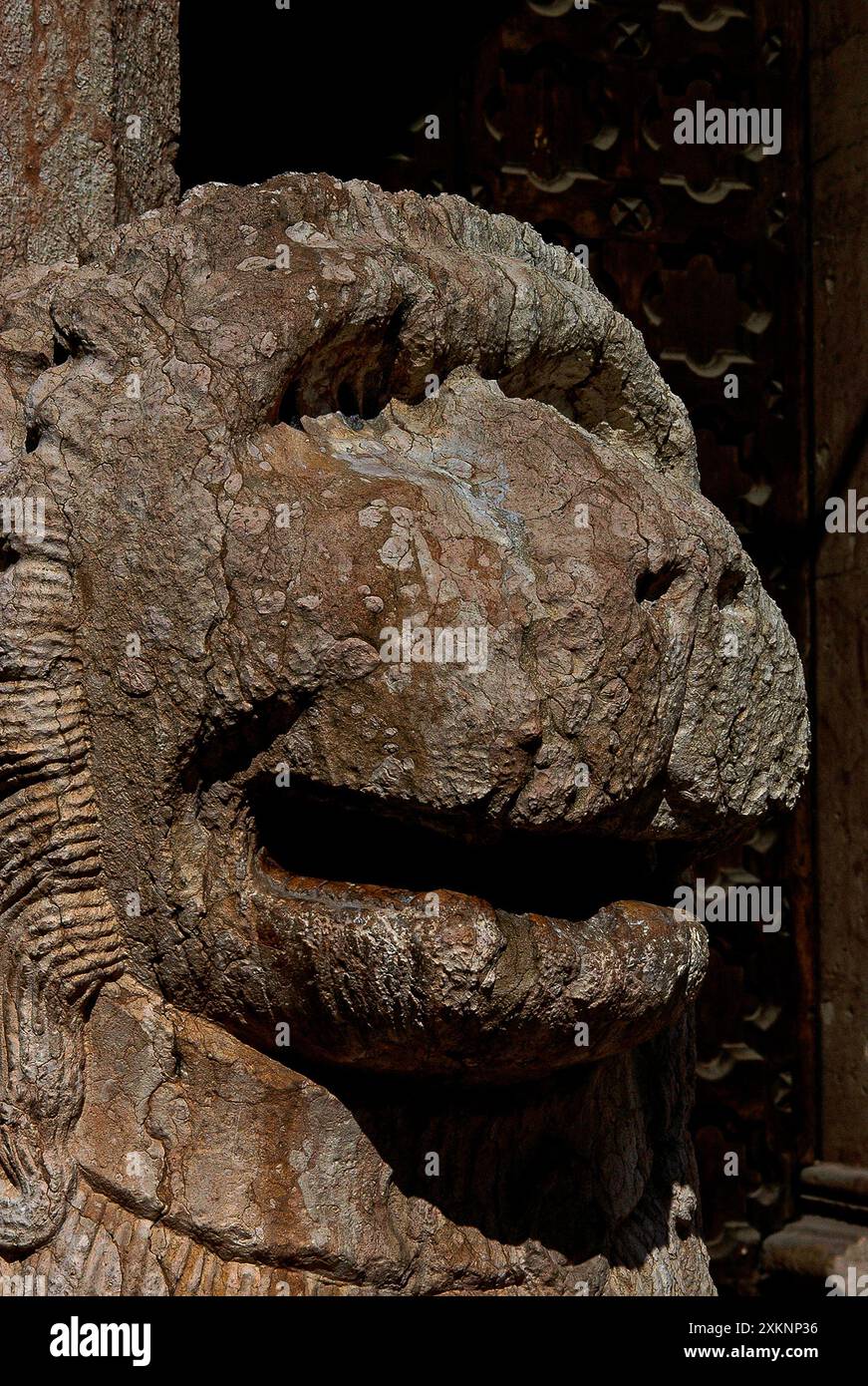Face of a lion flanking the Romanesque south-east porch of the ...