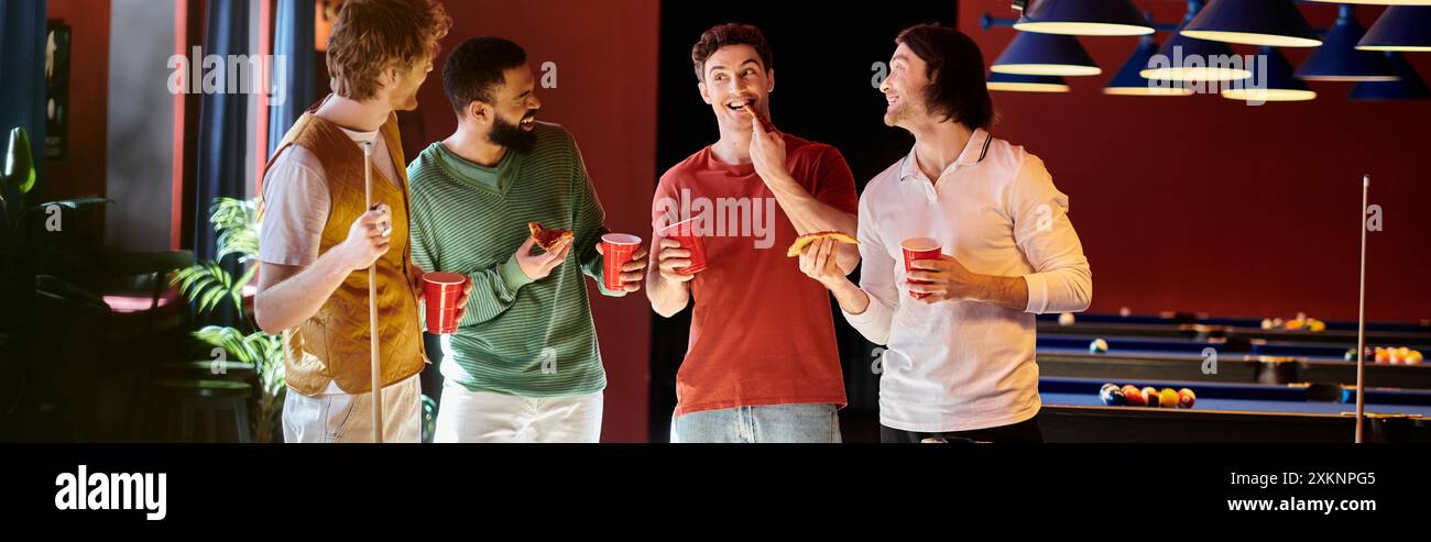 Friends stand by a billiard table, laughing and enjoying a casual game ...