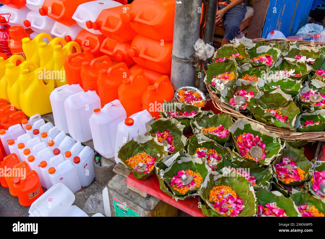 Different types of plastic cans are available to carry Ganga water in ...