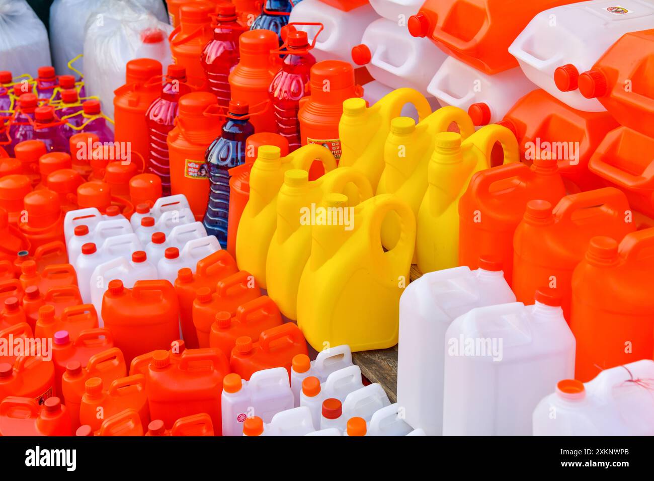 Different types of plastic cans are available to carry Ganga water in ...