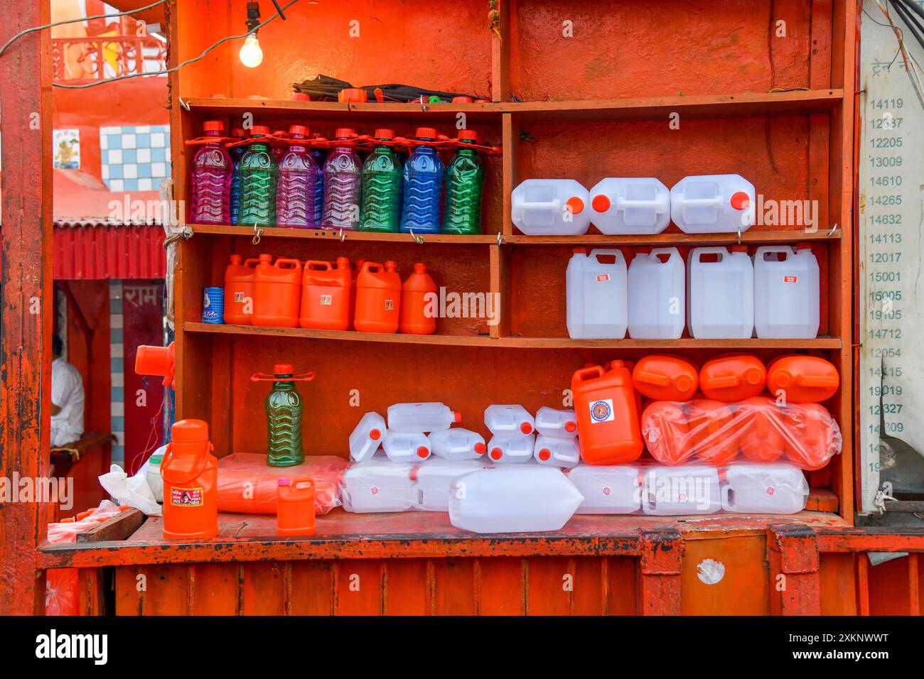 Different types of plastic cans are available to carry Ganga water in ...