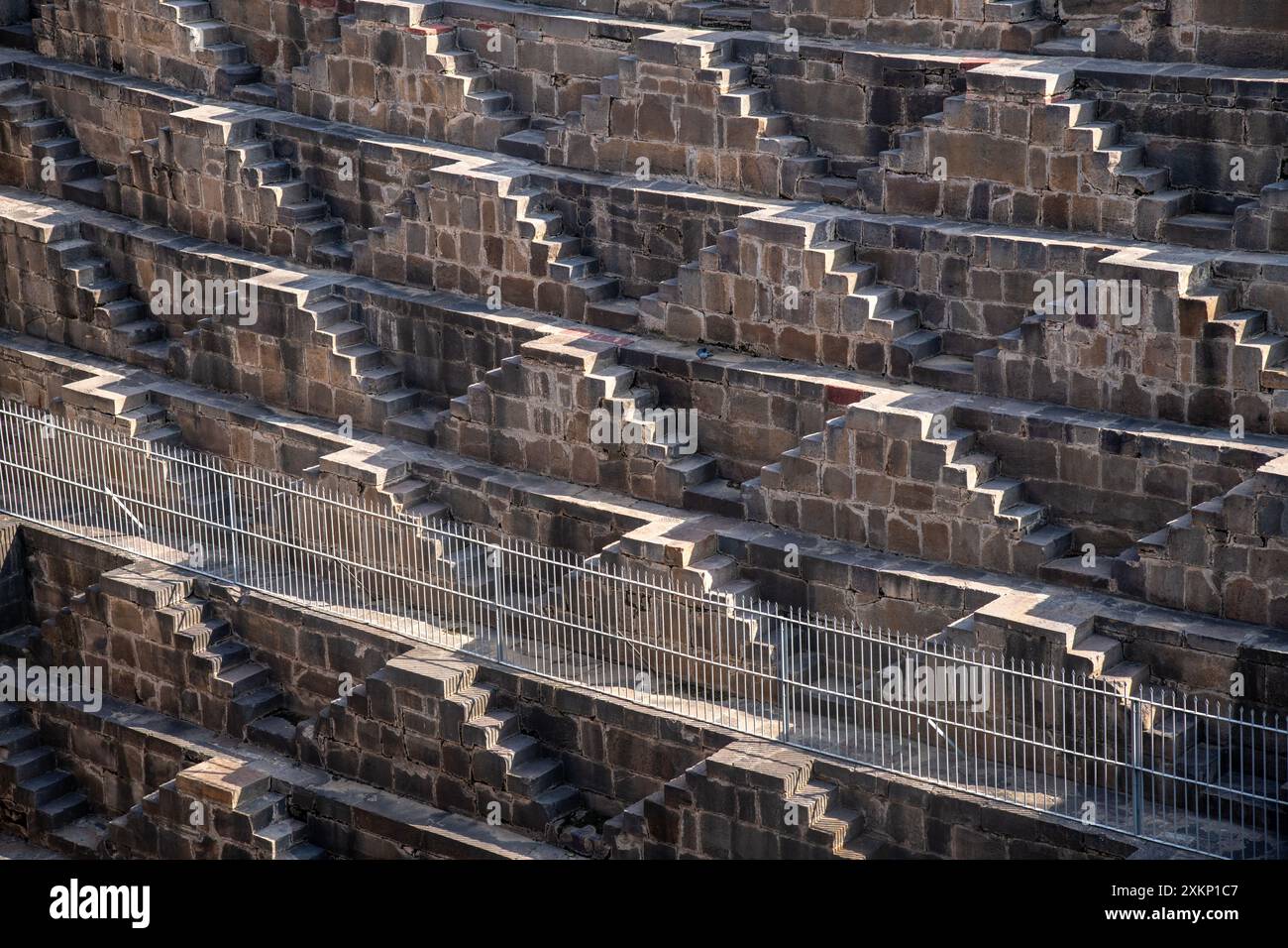 The steps of the Chand Baori Stepwell in Abhaneri, Rajasthan, India ...