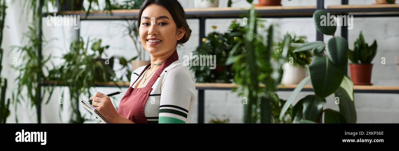 Young asian woman works diligently hi-res stock photography and images - Alamy