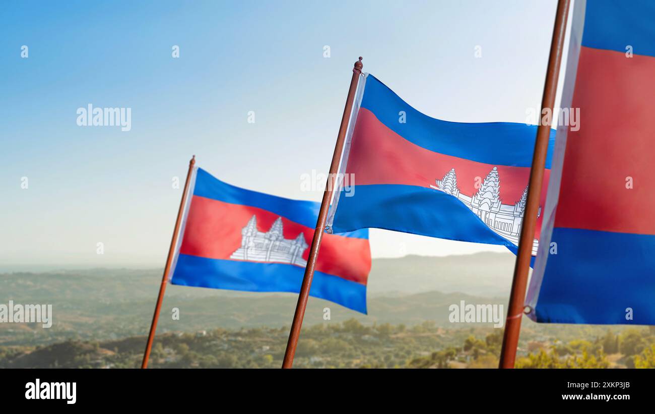 Three flags of a country are flying high in the sky. The Cambodia flag ...