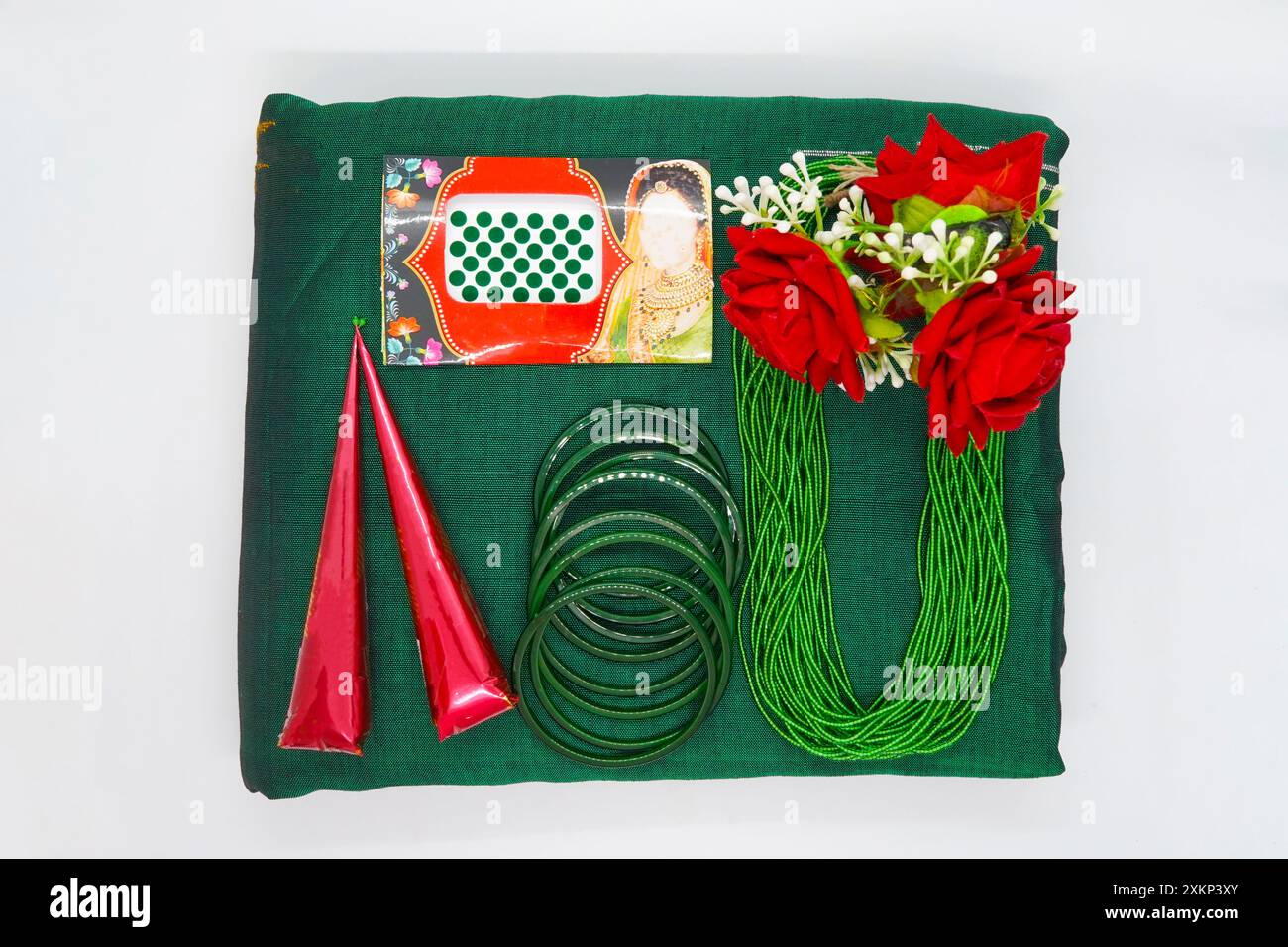 Shrawan Month Green Bangles, Mehendi Cones, Tika, Hair Flowers Gajra ...