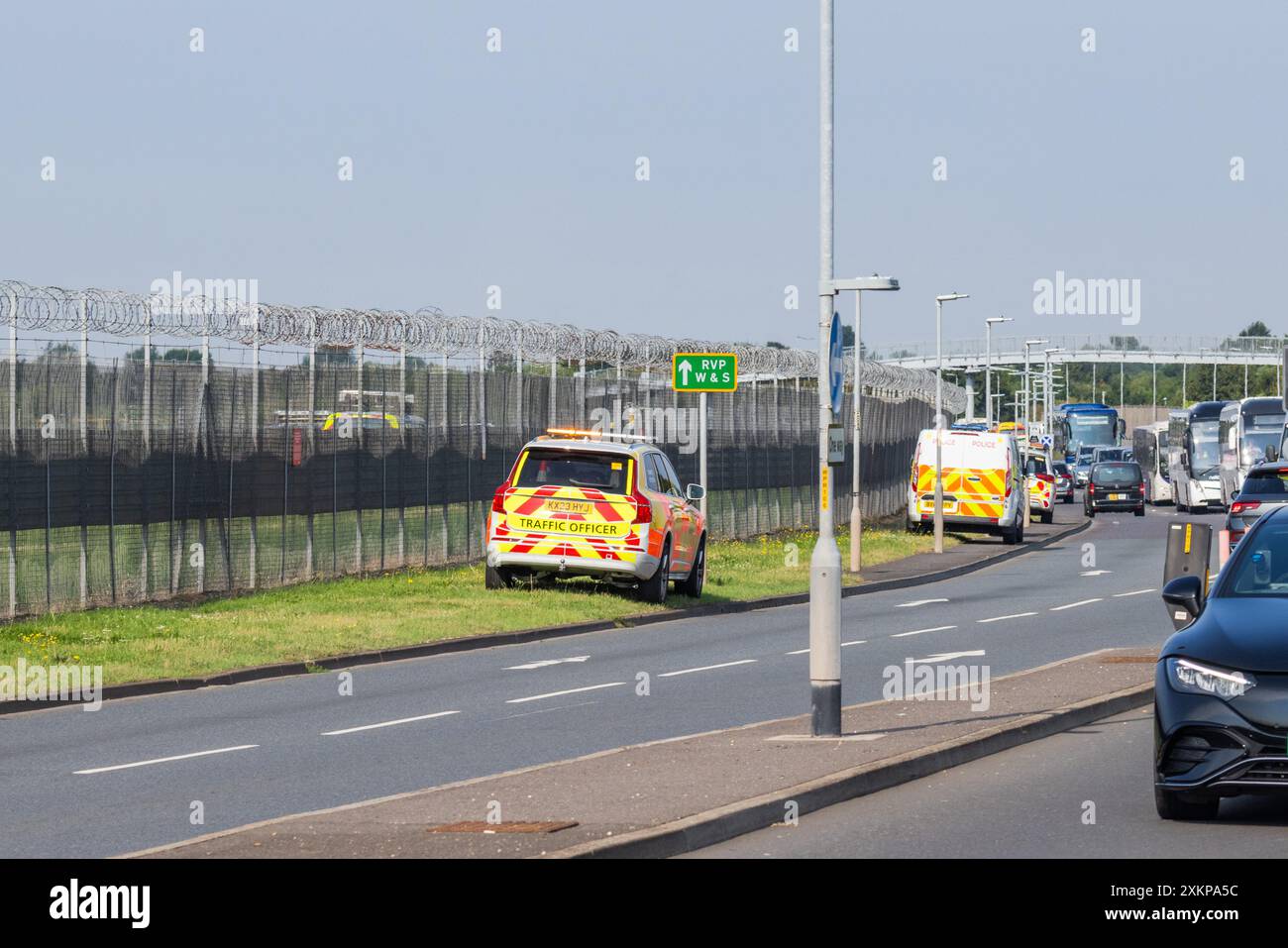 London, UK. 24 JUL, 2024. Police cars parked at the outer fence as Just ...