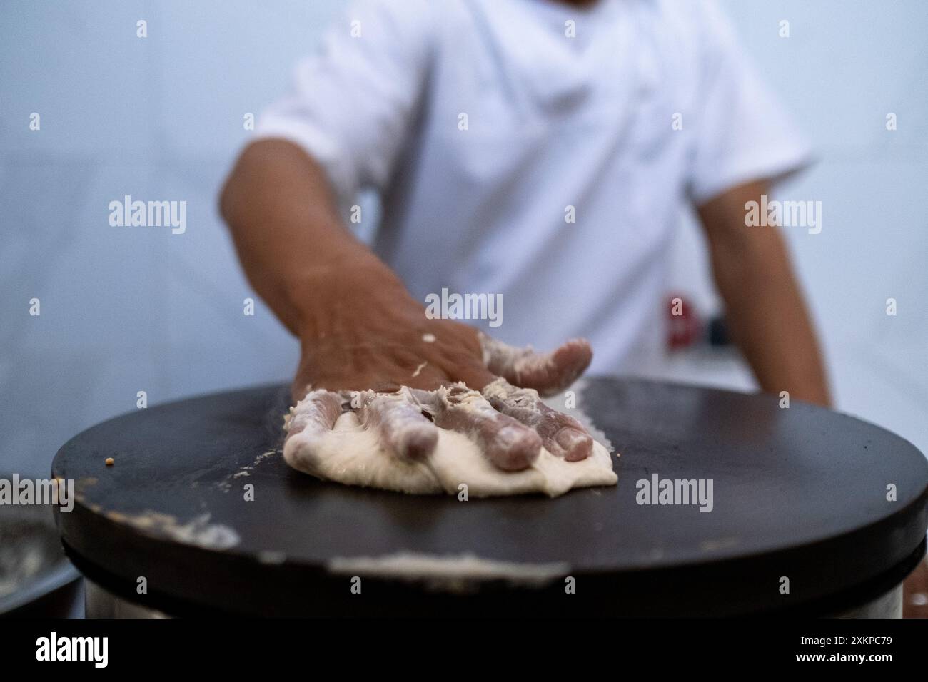 Preparation of a brick pastry sheet for the almond pastry roll at the ...