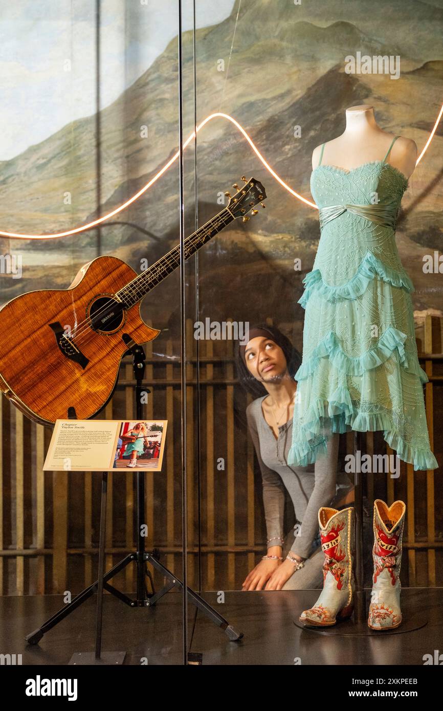 London, UK. 24 July 2024. 'Dress and customised cowboy boots worn by ...