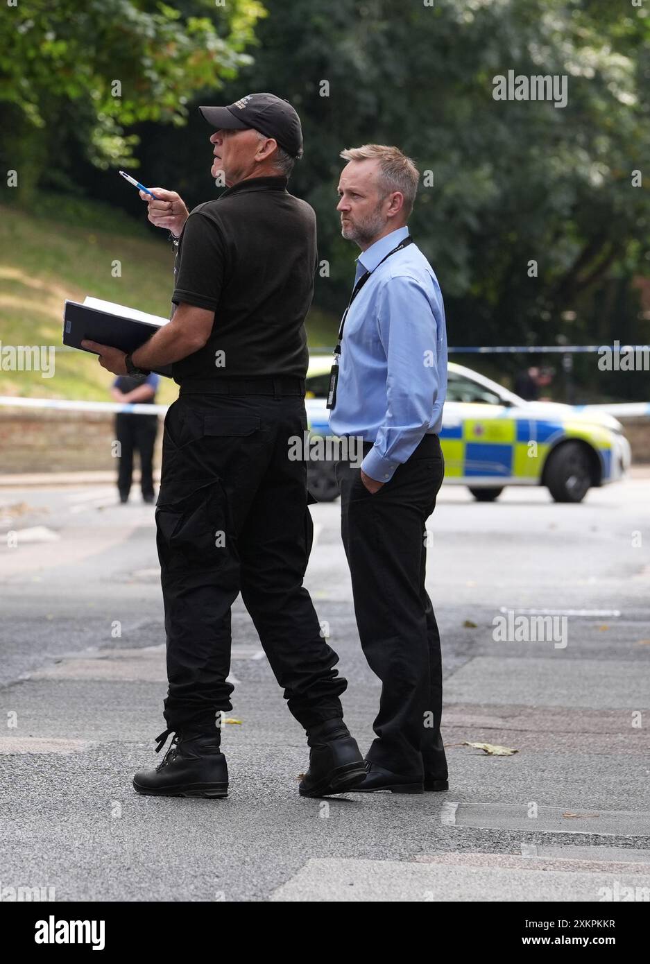 A police officer and a detective at the scene in Sally Port in ...