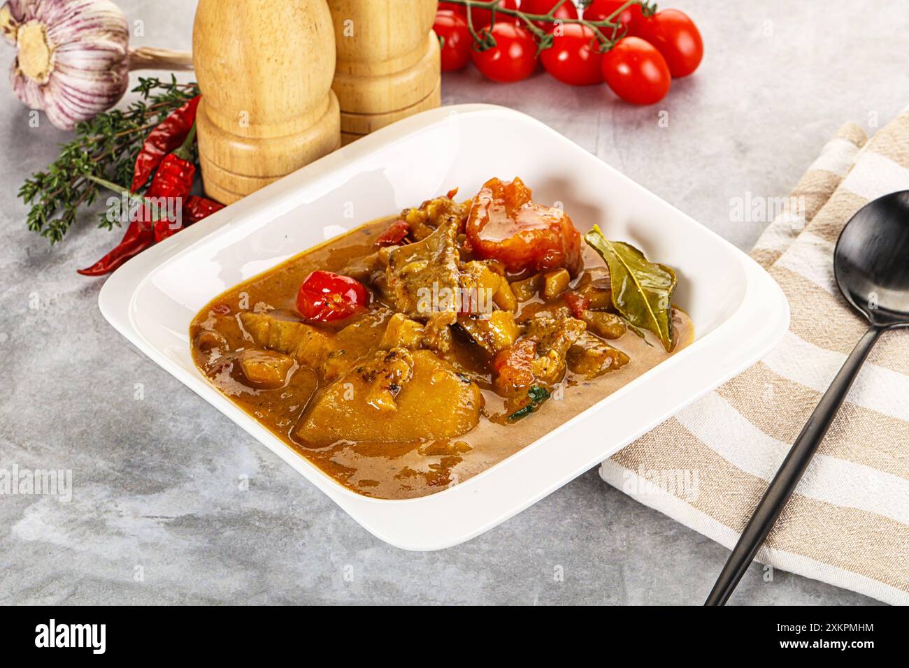 Yellow Thai curry soup with beef Stock Photo - Alamy