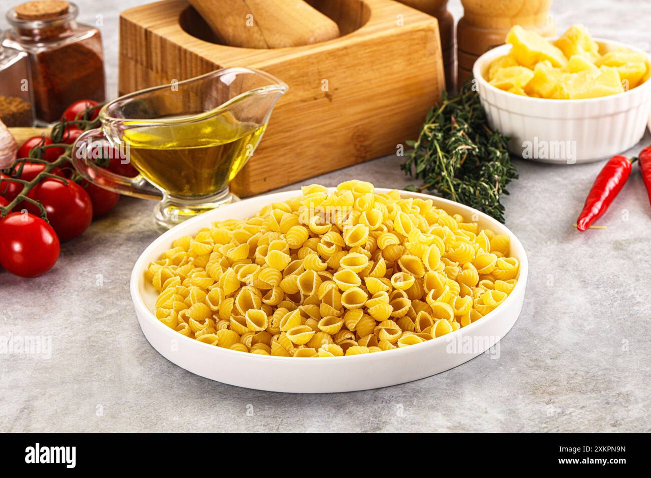 Italian cuisine - dry conchiglie shell pasta Stock Photo - Alamy