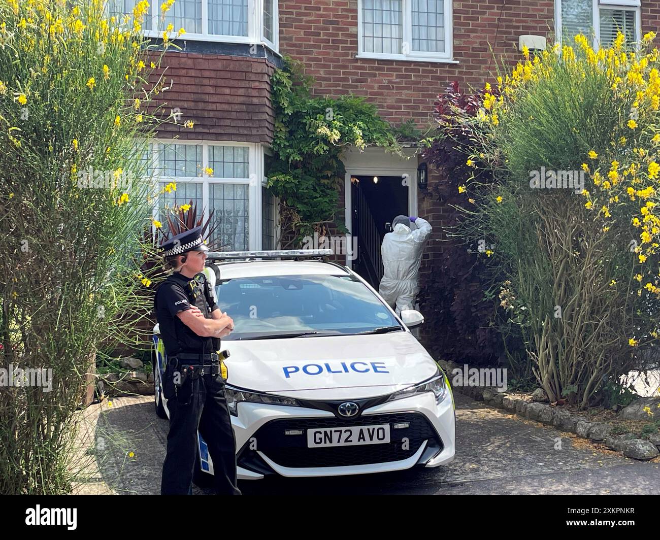 Forensic officer enters a home in Mooring Road, Rochester in Kent. A ...