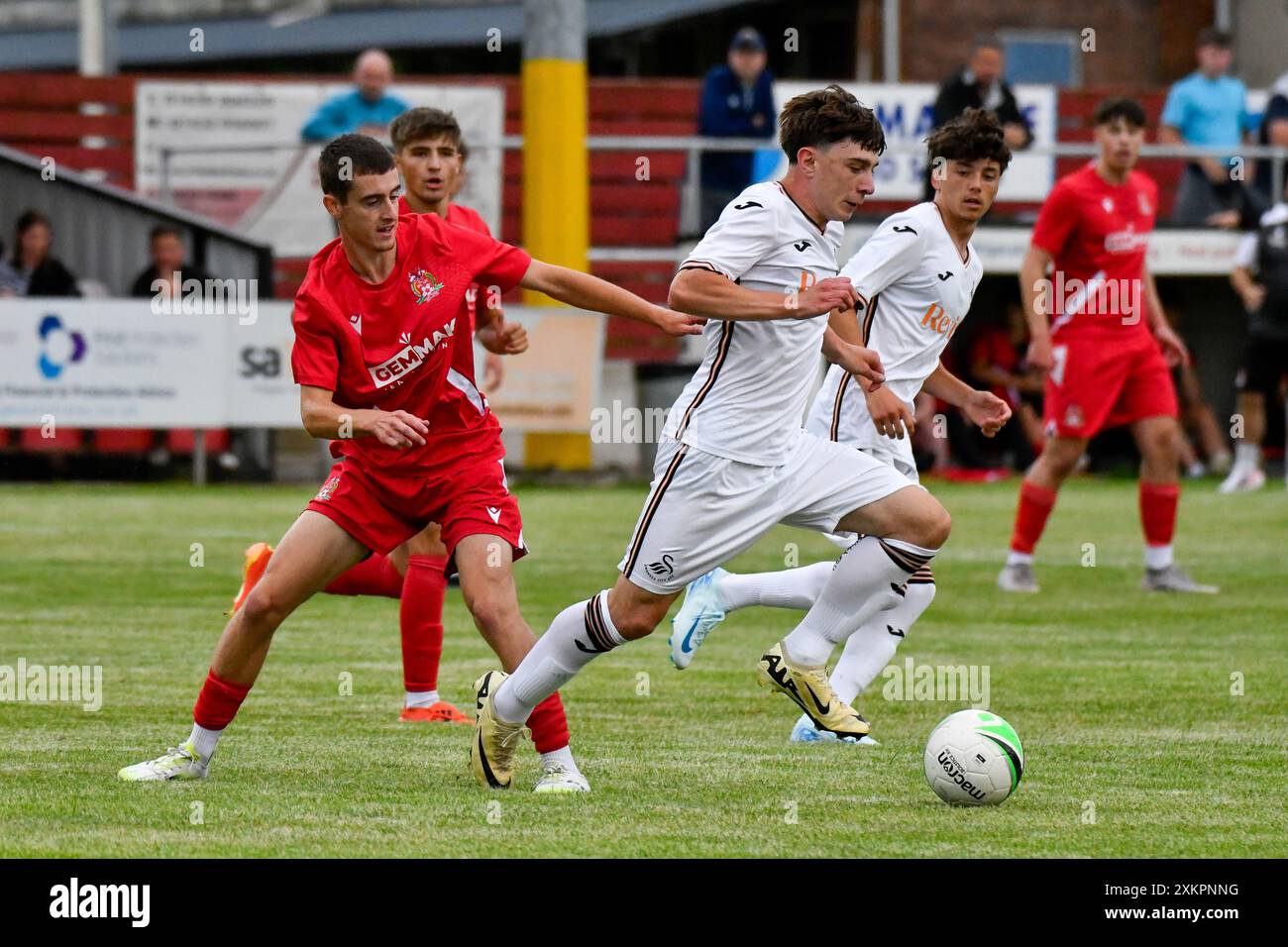 Briton Ferry, Wales. 23 July 2024. Harlan Perry of Swansea City goes on ...