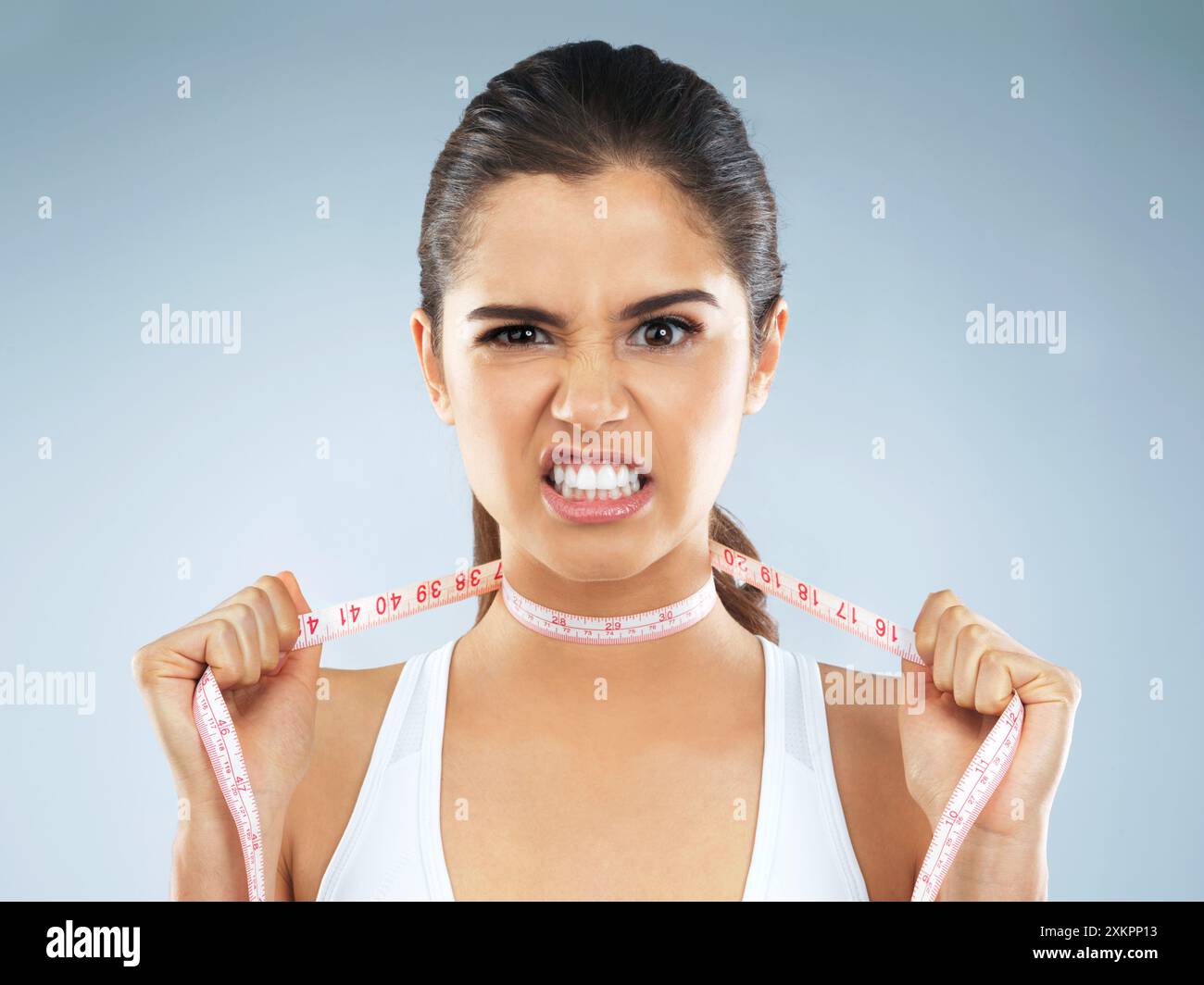 Angry, woman and portrait with measure tape and choke from difficult ...