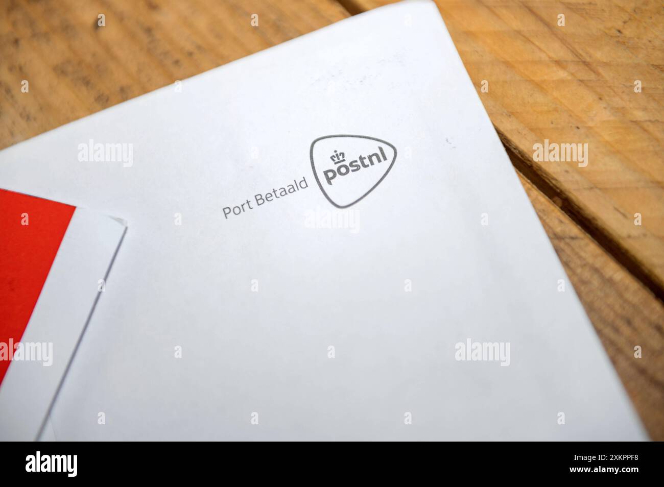 General stock Prepaid envelope with a stamp of PostNL postage company ...