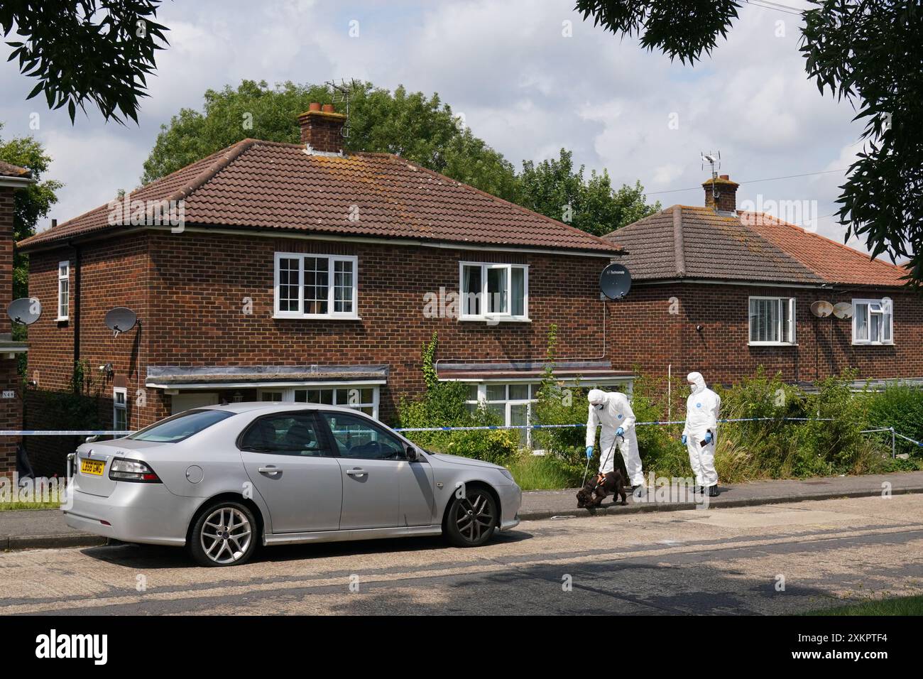 Forensic officers on Mooring Road, Rochester in Kent, where a moped was ...