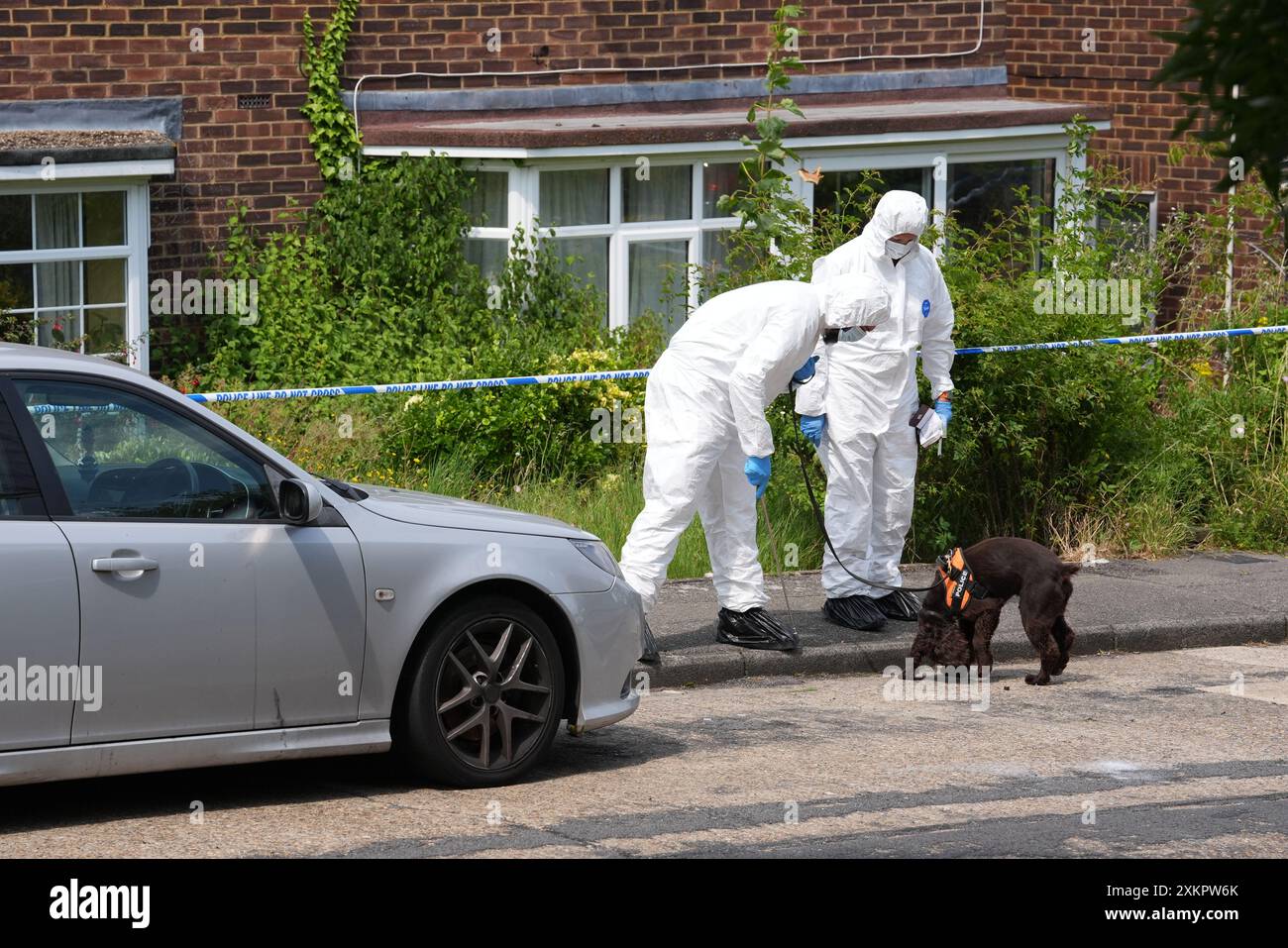 Forensic officers on Mooring Road, Rochester in Kent, where a moped was ...